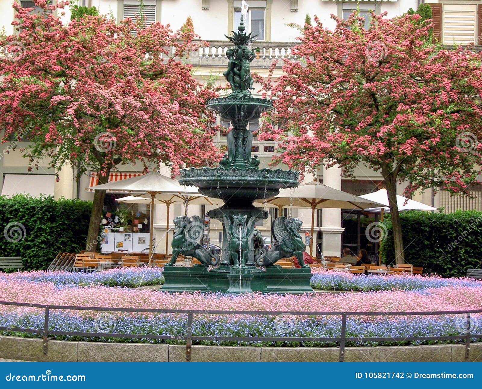 Flower Fountain in the Spring Stock Photo - Image of blooming, lions ...