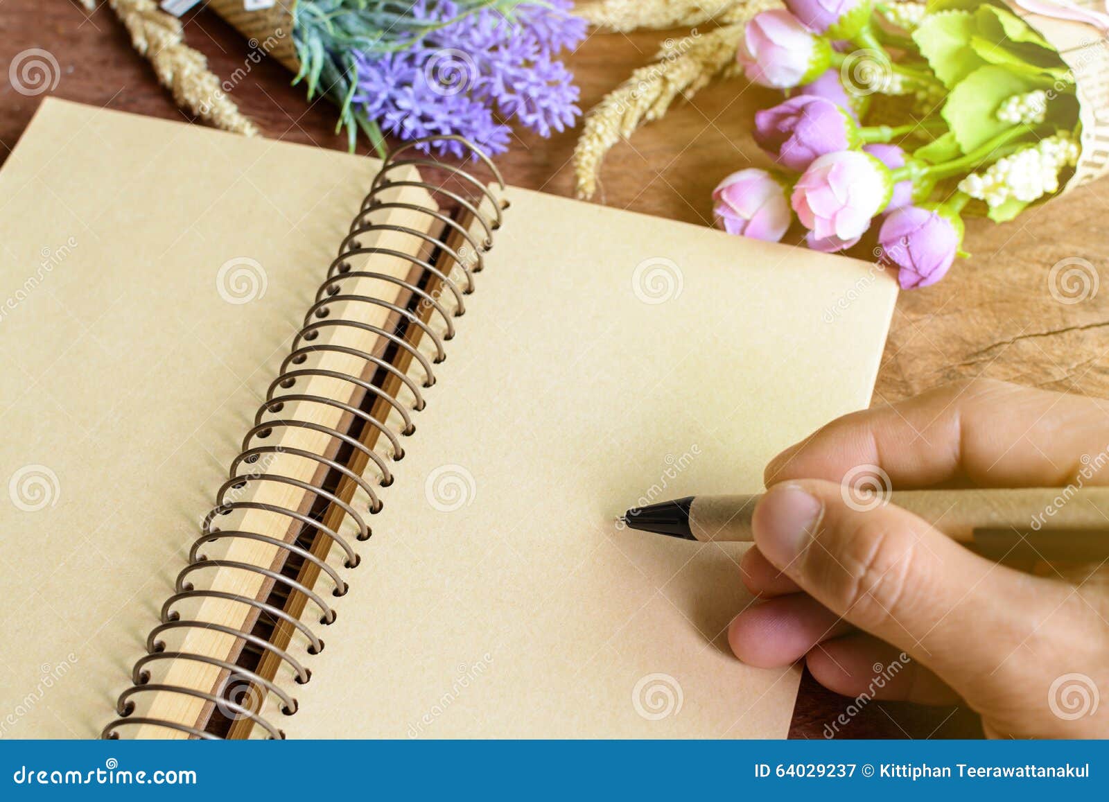 Flower and Hand Writing on Blank Notebook on Wooden Table Stock Image ...