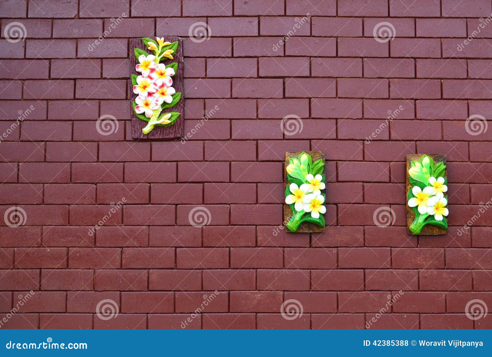 Flower Sculpture on Brick Wall Stock Photo - Image of texture ...