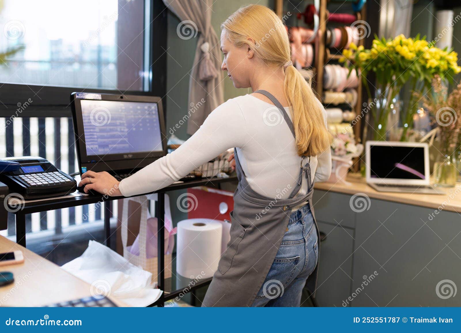 Flower Shop Manager Keeps Accounting Records in a Computer Stock Image ...