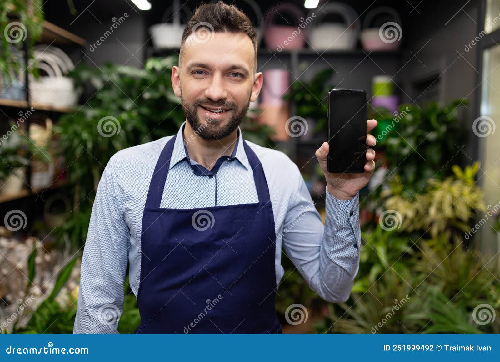 Flower Shop Manager Showing Smartphone Screen Stock Photo - Image of ...