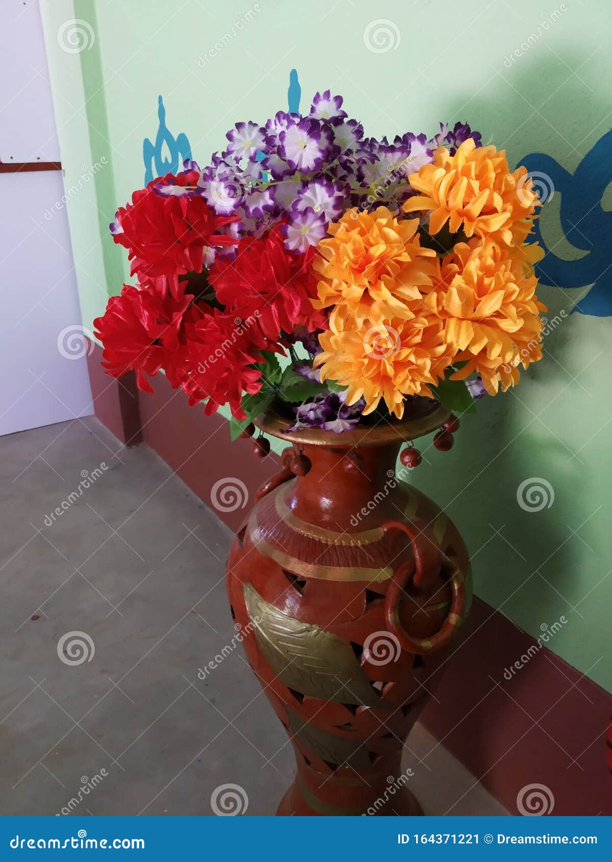 Flower Vash with Bright Colors Flower Yellow Rewards Mud Vash Stock ...