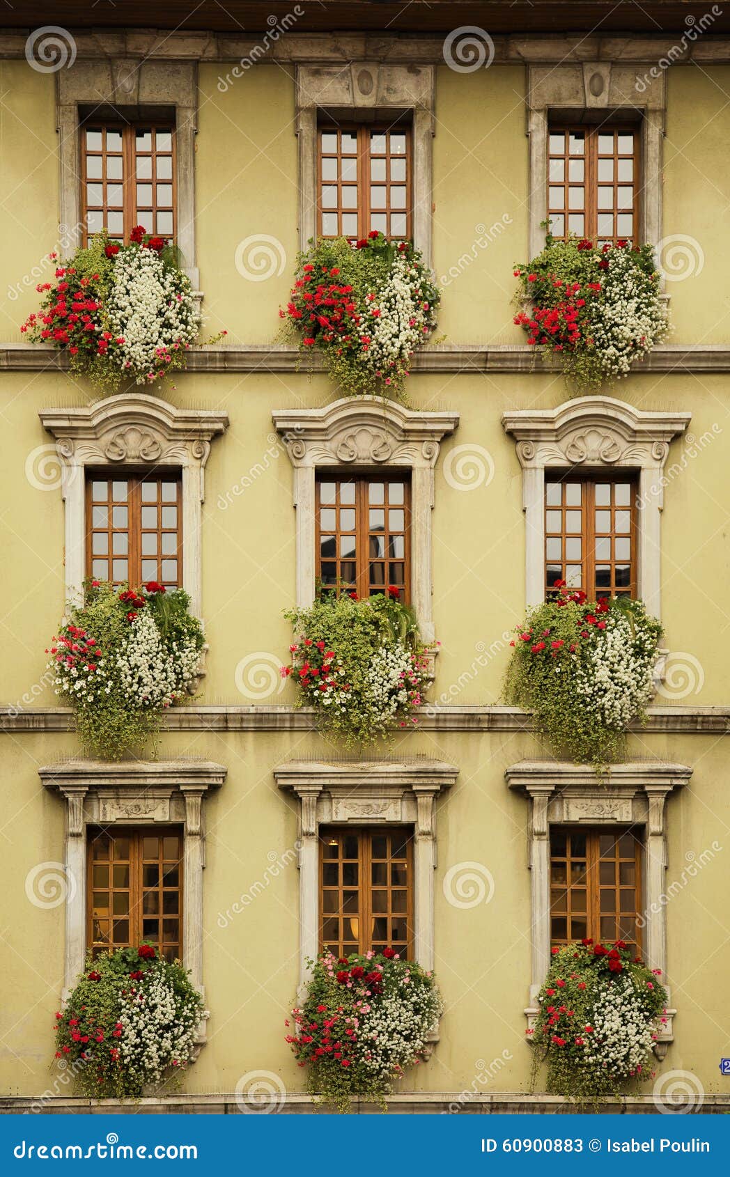 Flowered windows stock image. Image of building, flowers - 60900883