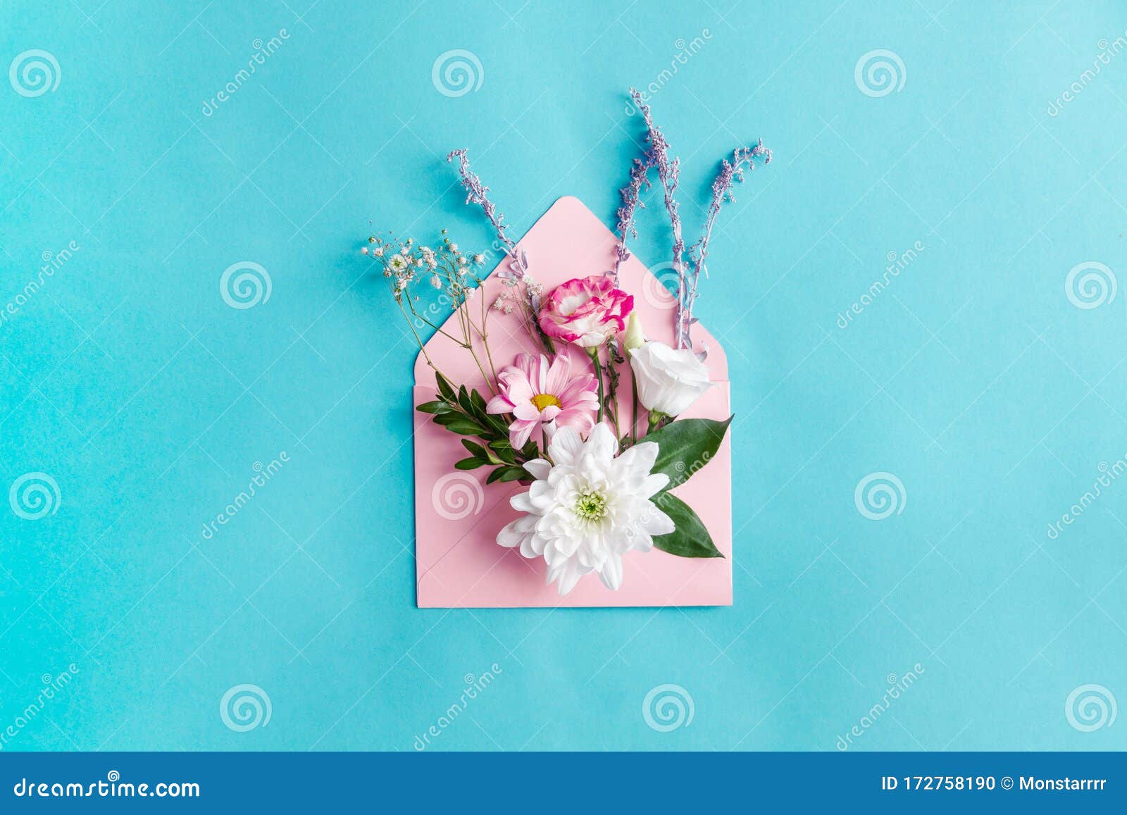 Flowers in Envelope Isolated on Blue Background. Spring Concept Stock ...