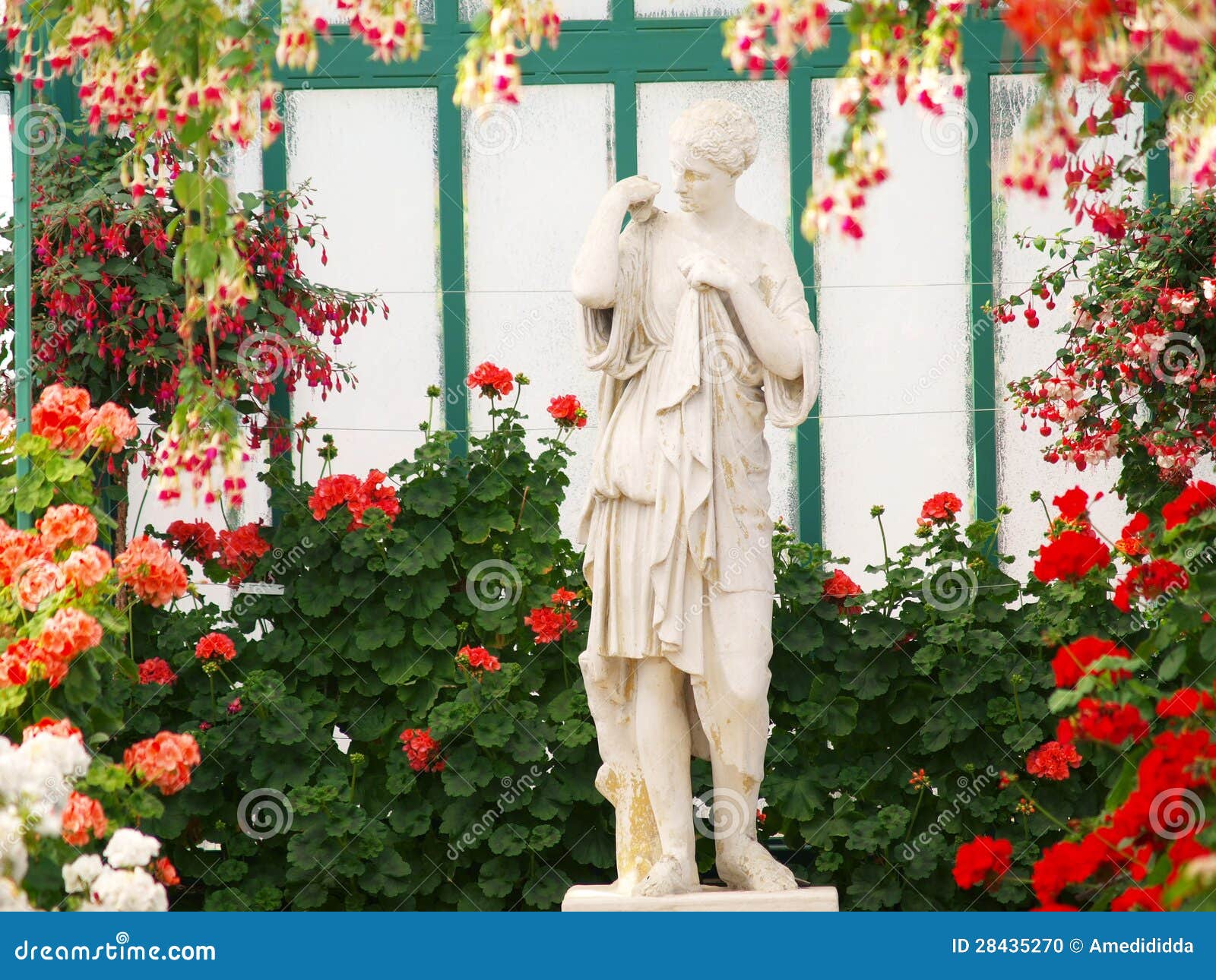 Flowers and female statue stock photo. Image of environment - 28435270