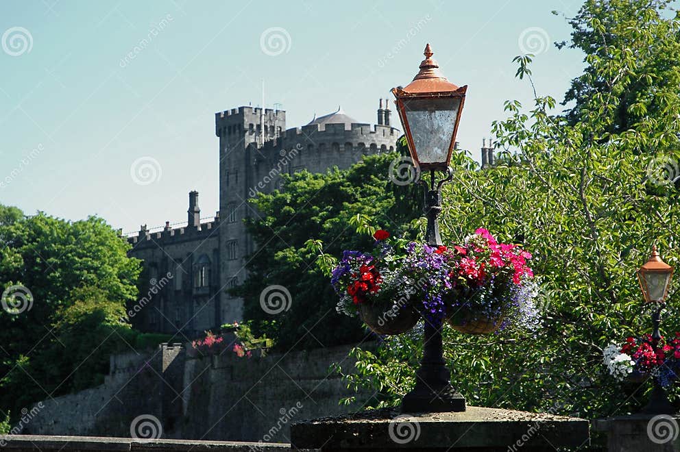 Flowers in Front of Old Castle Stock Image - Image of light, colourful ...