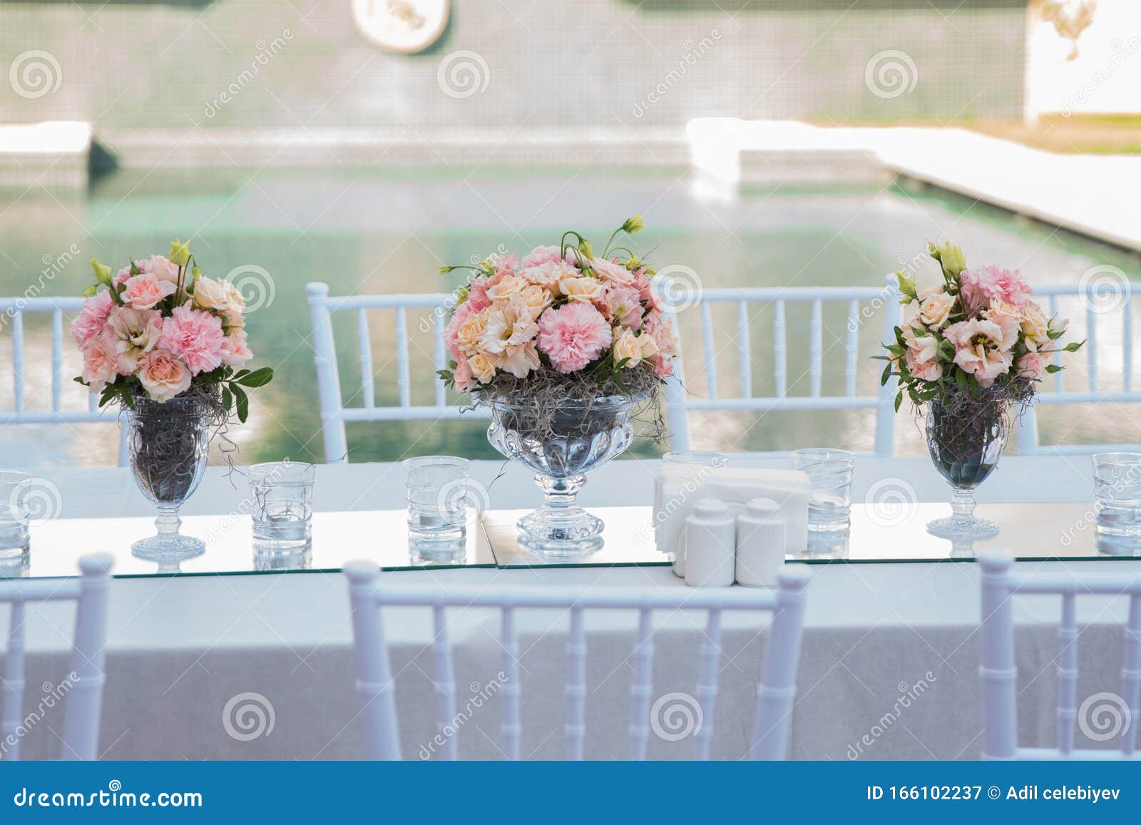 Flowers in a Glass Cup. Flowers on a Glass Table. Flowers in a Glass ...