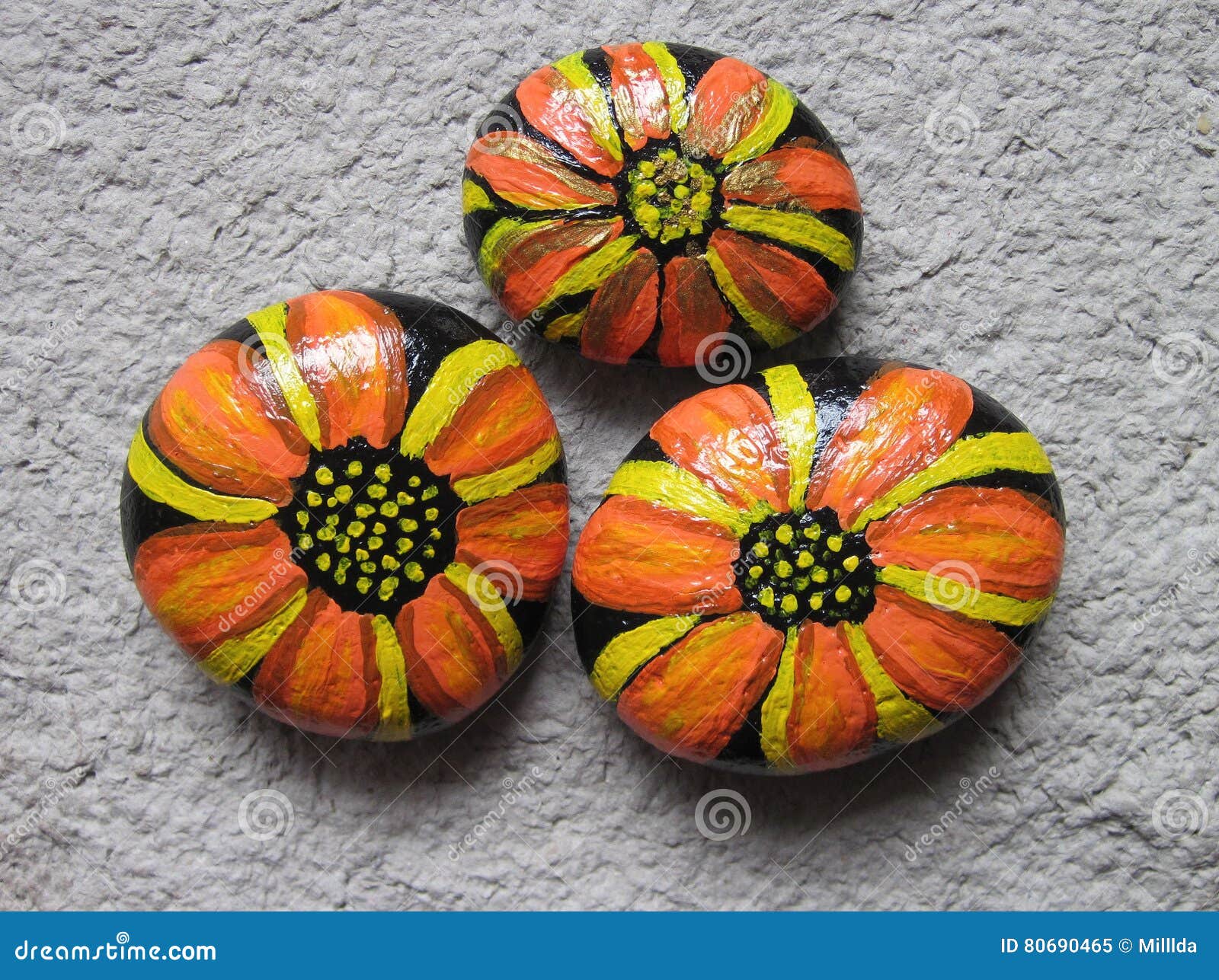 Flowers painted on stones stock image. Image of view - 80690465