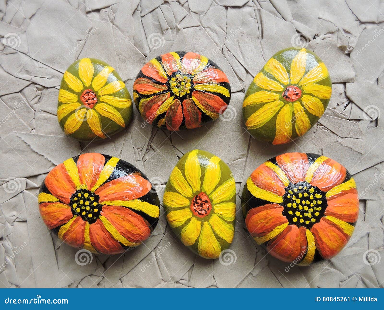 Flowers painted on stones stock image. Image of colored - 80845261