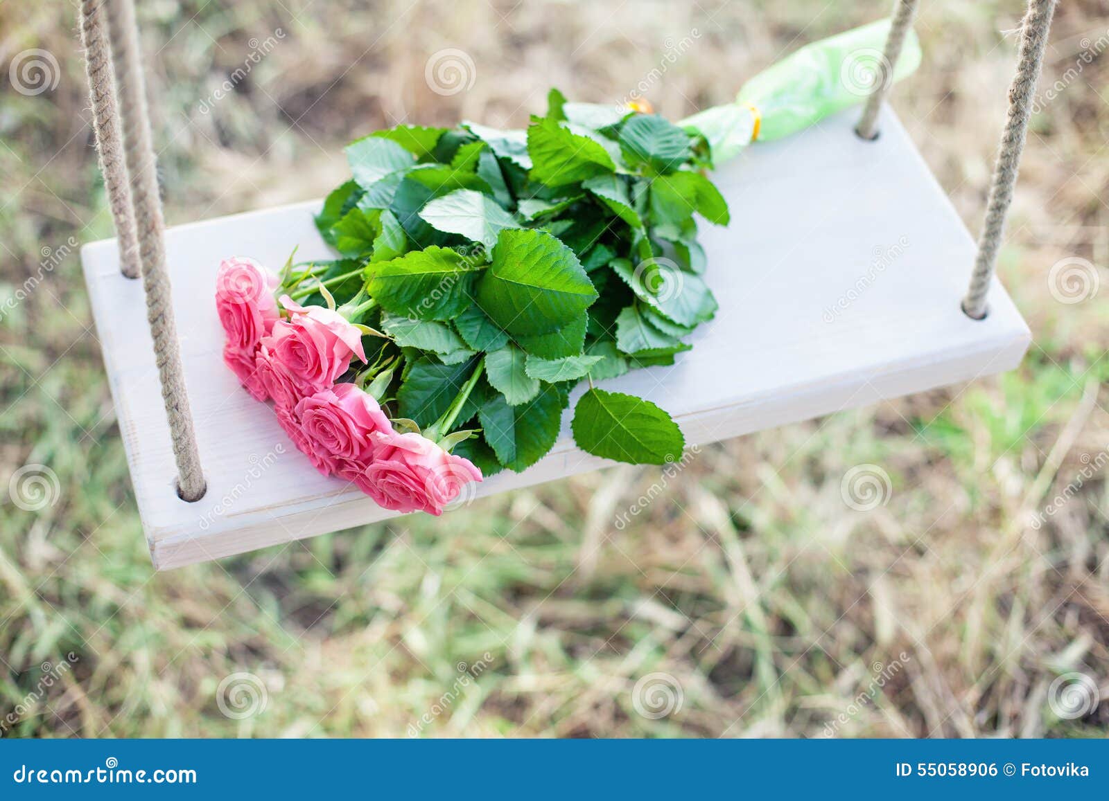 Flowers on a swing stock photo. Image of anniversary - 55058906