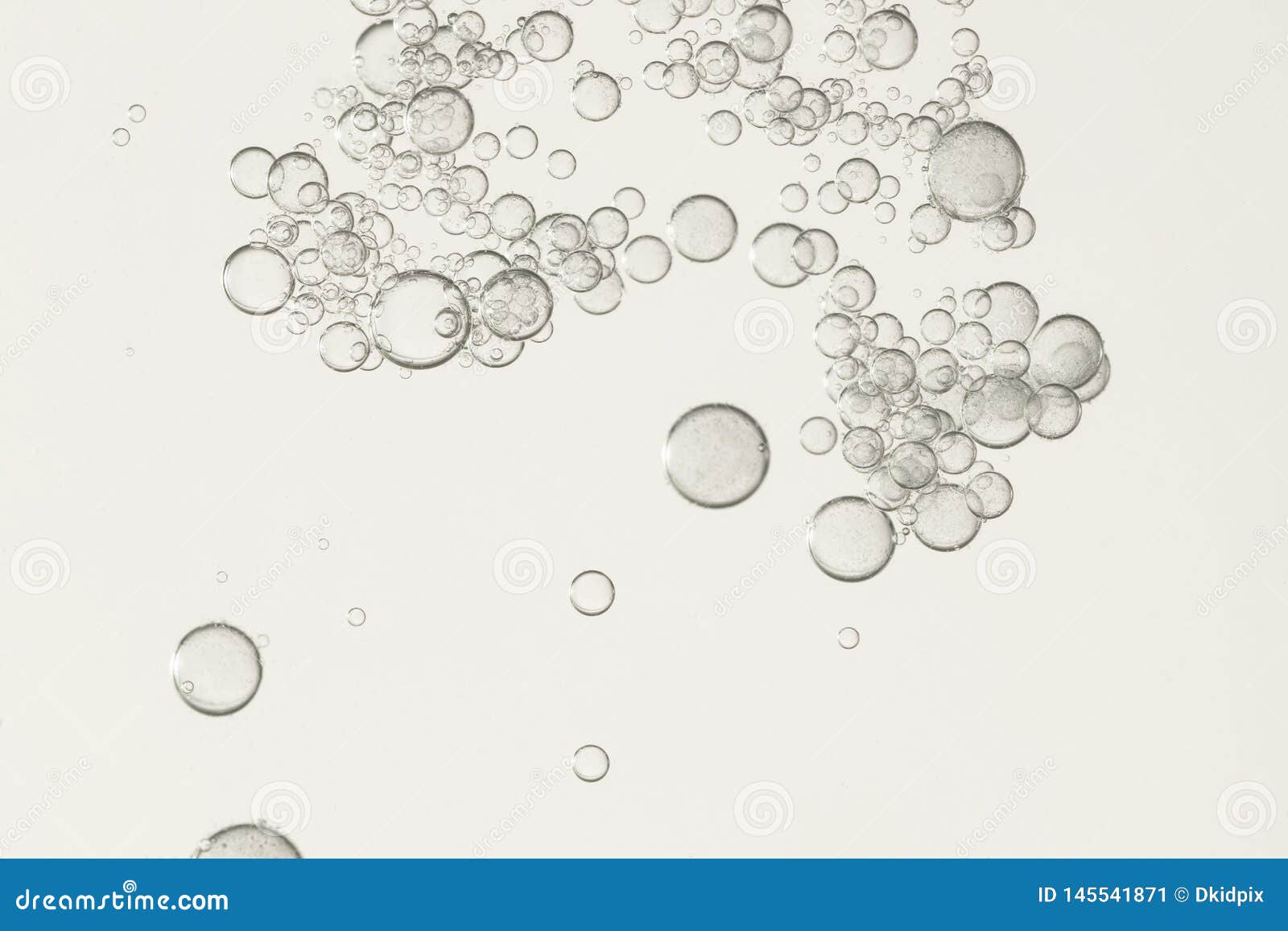 Flowing Fizz Bubbles Over a Beige Surface. Stock Image - Image of ...