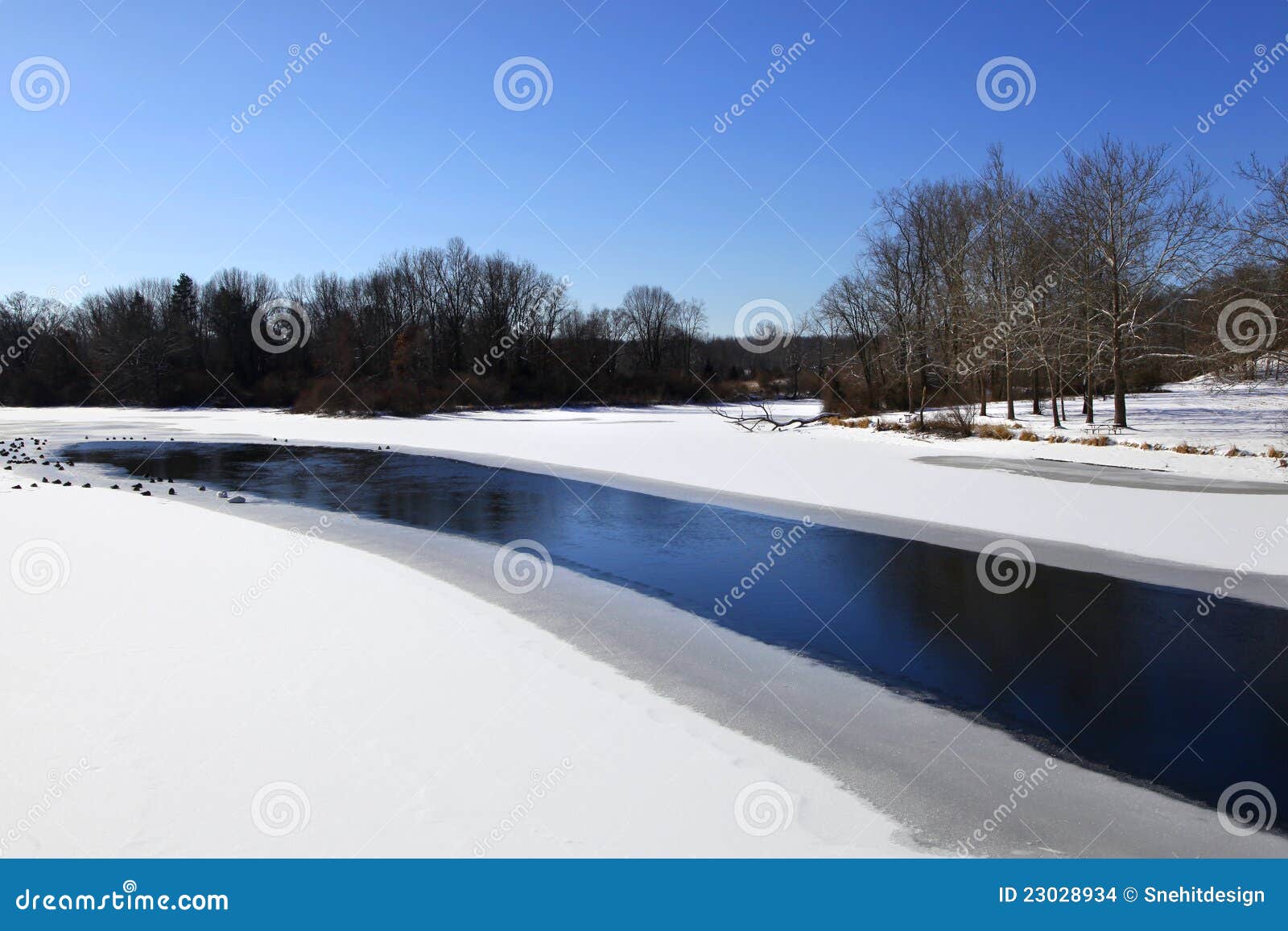 Flowing river in the snow stock photo. Image of river - 23028934