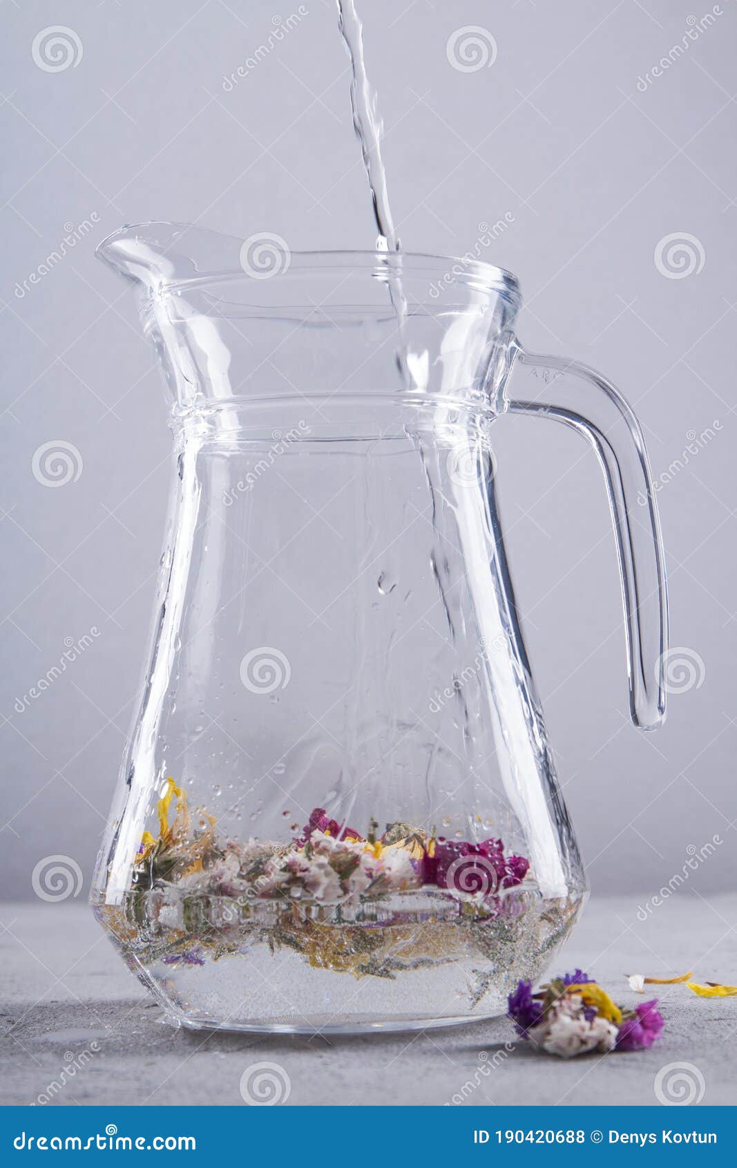 Flowing Water into Jug with Flowers. Stock Photo - Image of cool, flow ...