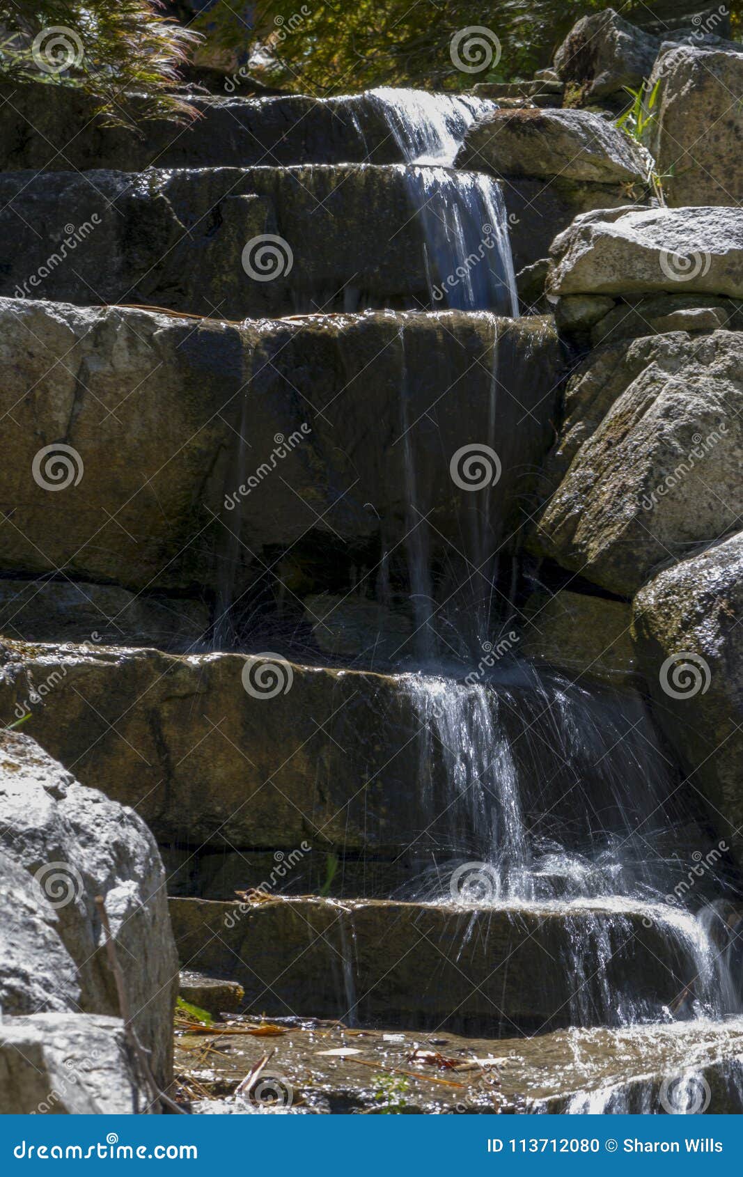Flowing Water Over a Rock Feature Waterfall Stock Photo - Image of rock ...