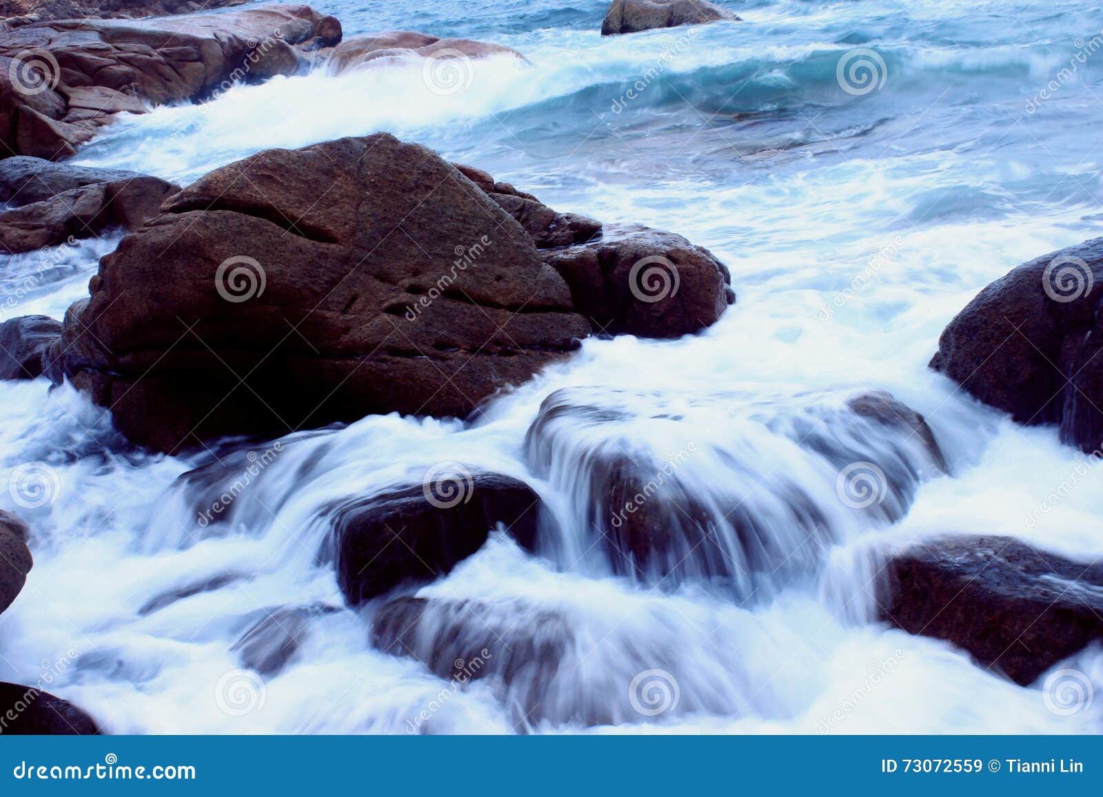 Flowing water on rocks stock image. Image of lake, stone - 73072559