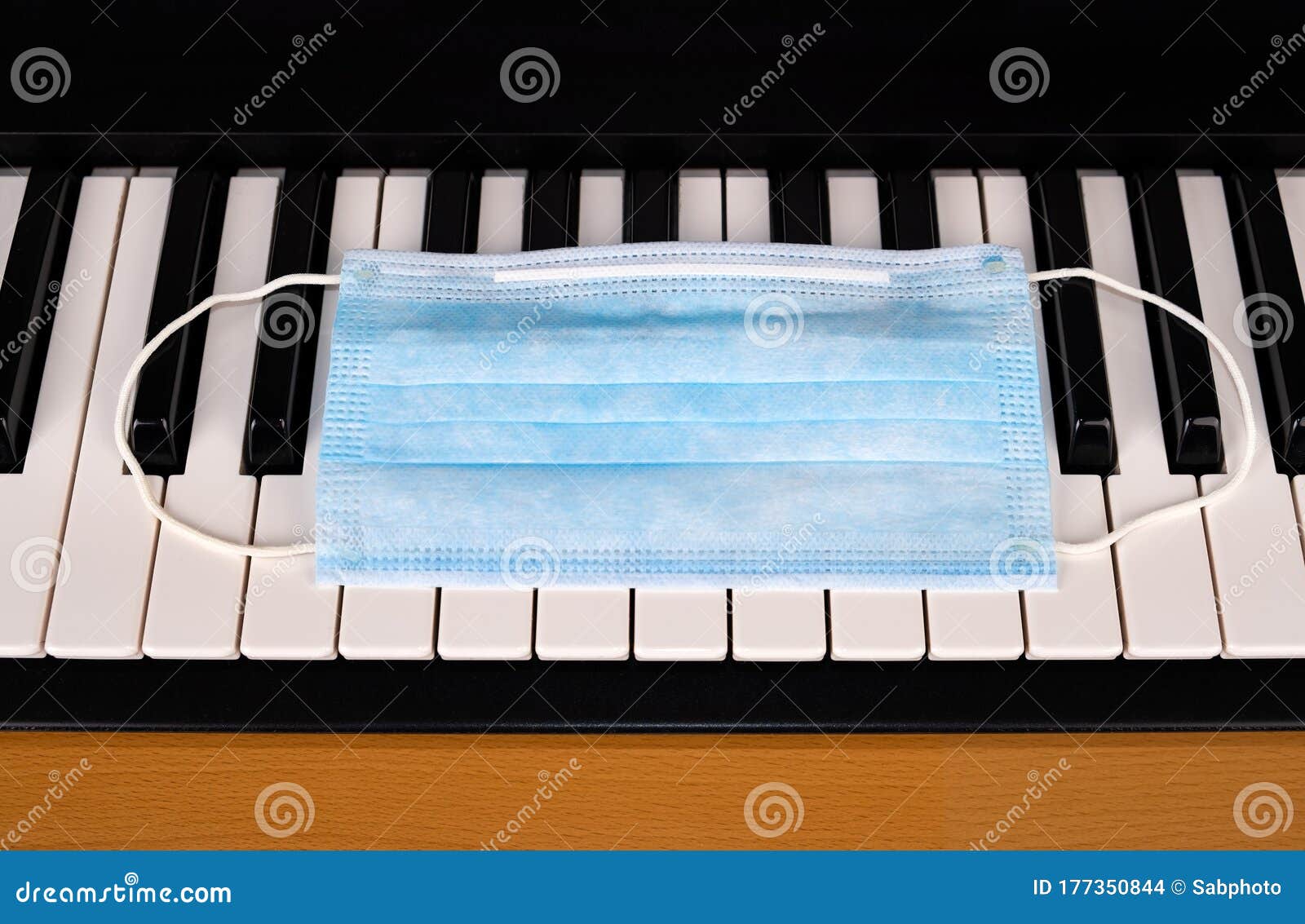 Flu Mask on the Piano stock photo. Image of blue, keys - 177350844