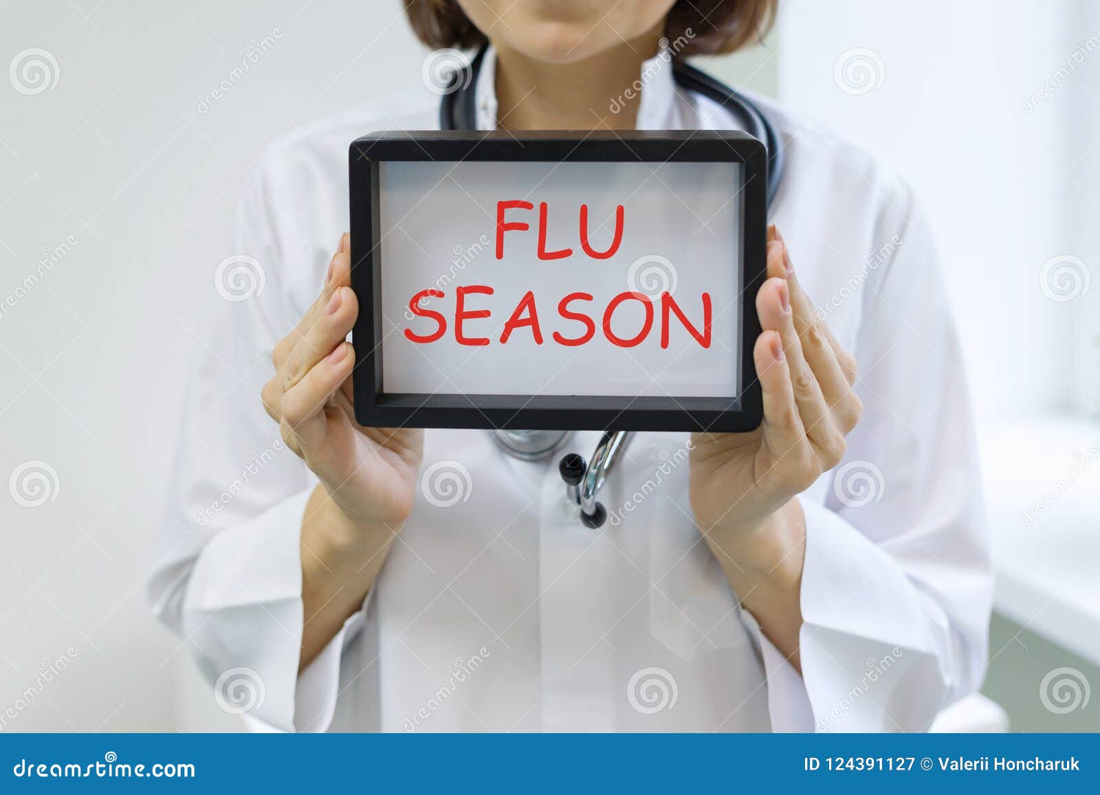 Flu Season Text in the Hands of a Female Doctor Stock Image - Image of ...