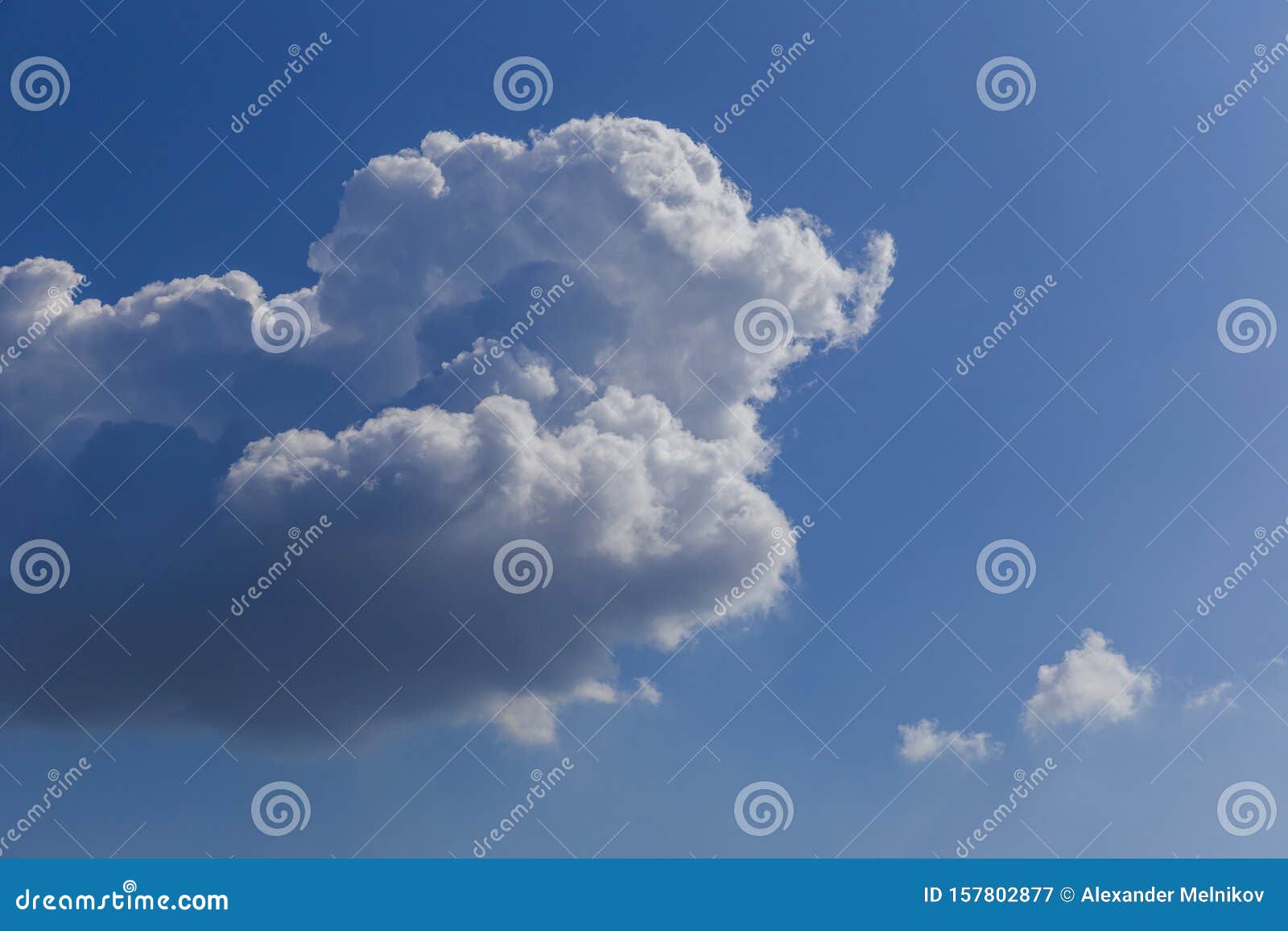 Fluffy Beautiful Clouds on a Background of Blue Sky Stock Image - Image ...