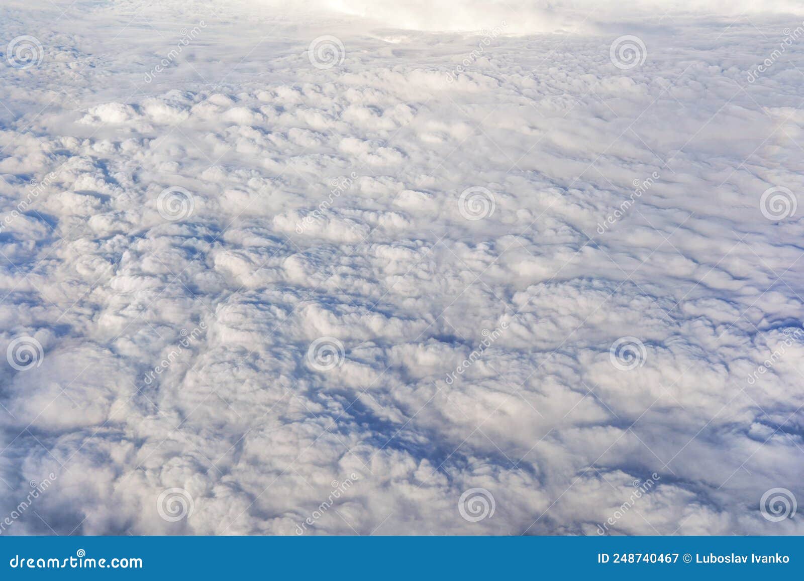 Fluffy Clouds that Looks As Flat Surface As Seen from Commercial ...