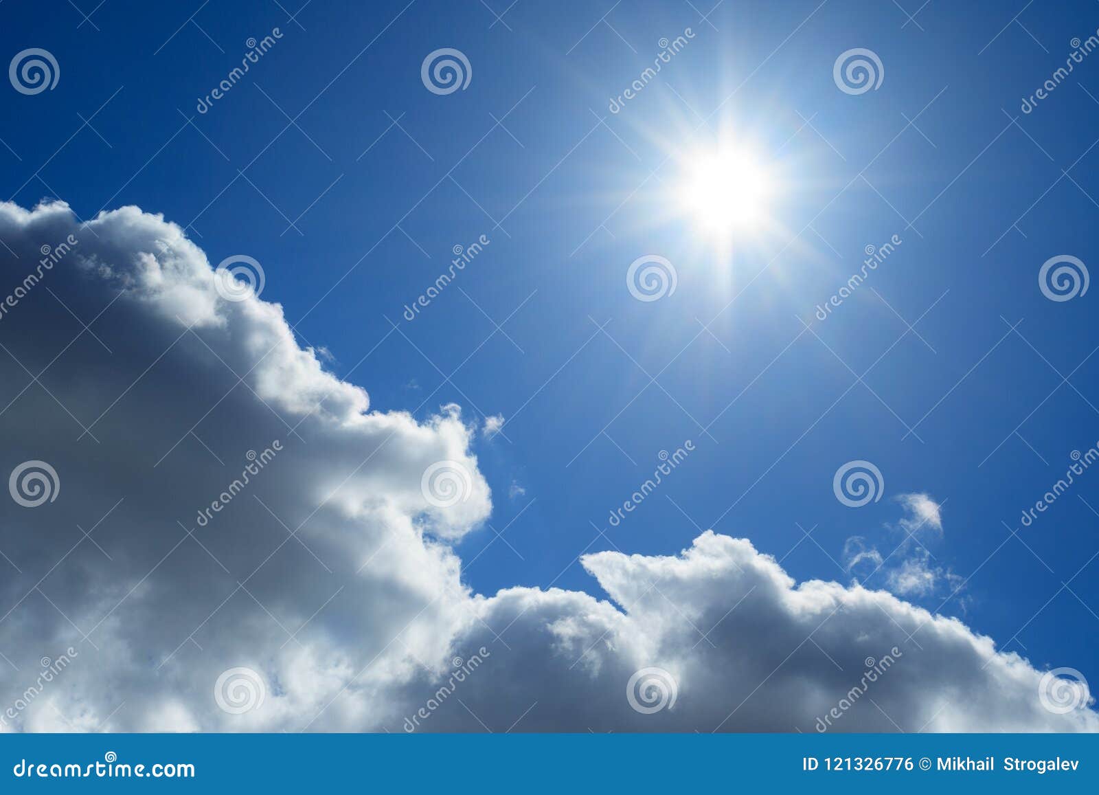 Fluffy Clouds and Sun in Deep Blue Sky Stock Photo - Image of outdoor ...