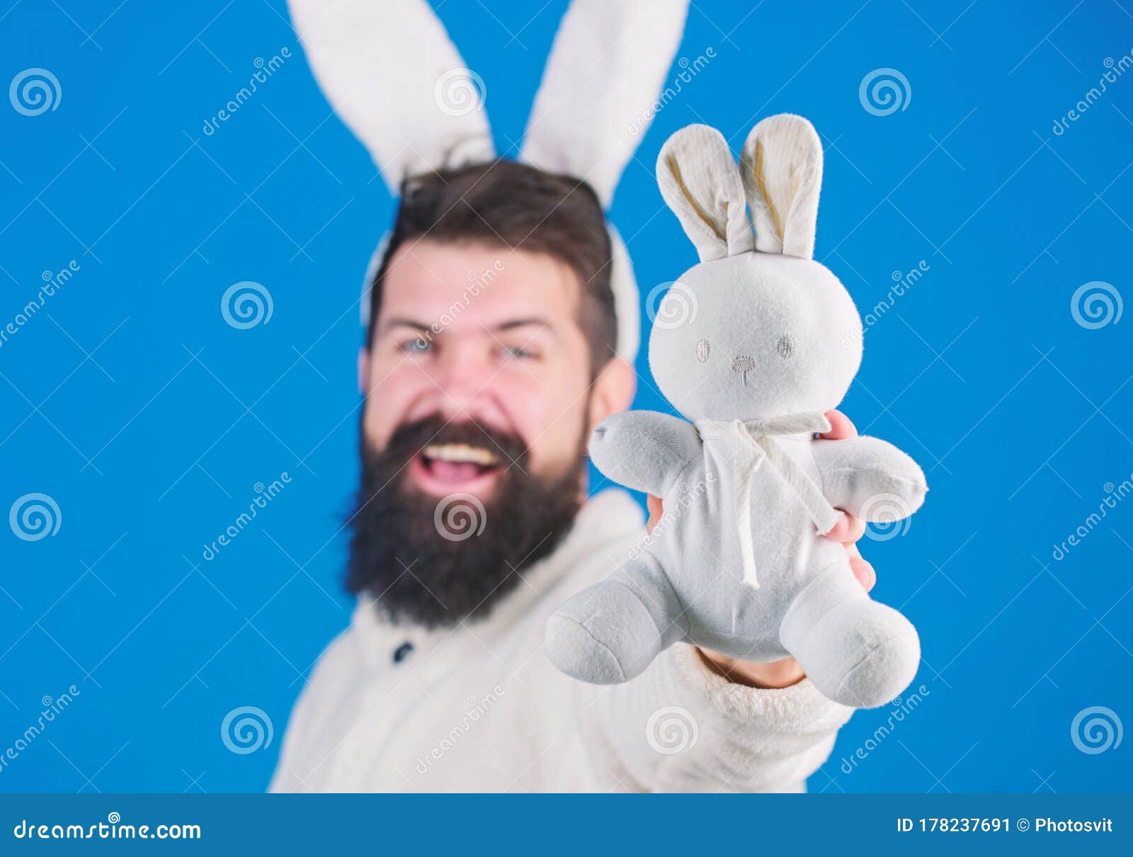 A Fluffy Pet. Bearded Man in Easter Rabbit Costume with Hare Toy Stock ...