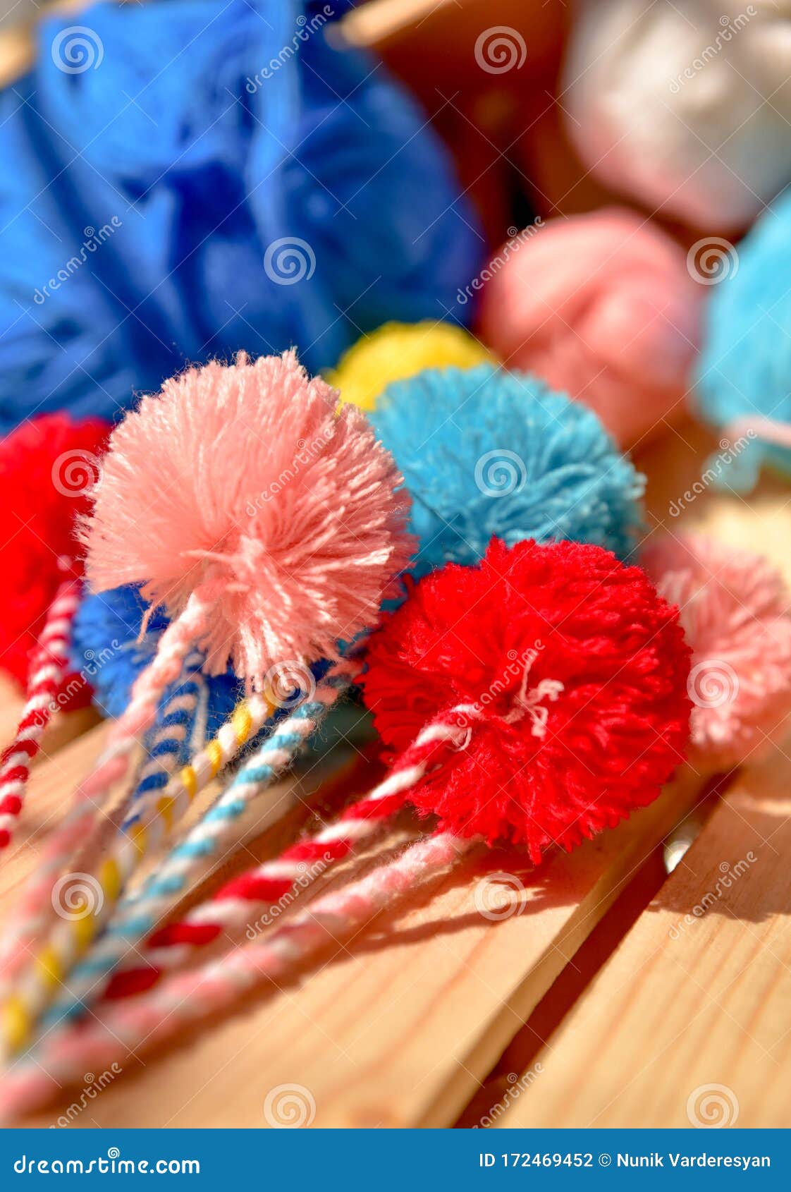 Fluffy Pom Poms with Multi-colored Threads. Stock Photo - Image of ...