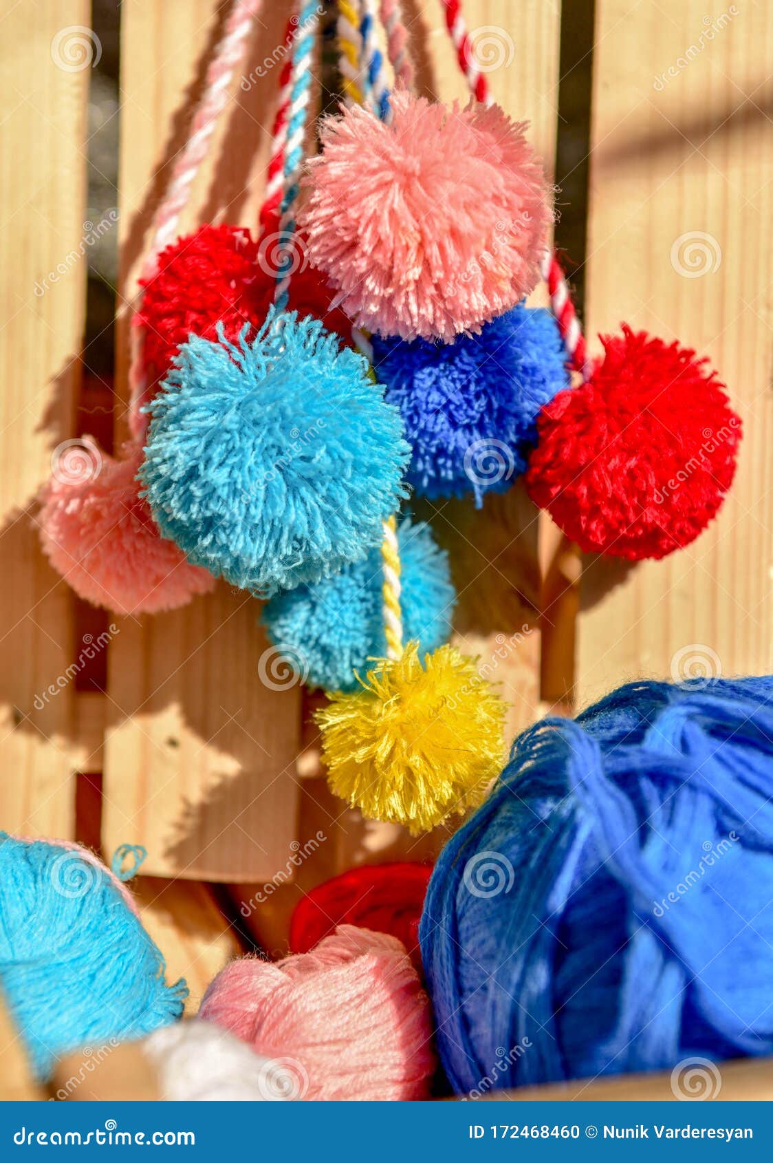 Fluffy Pom Poms with Multi-colored Threads. Stock Photo - Image of blue ...