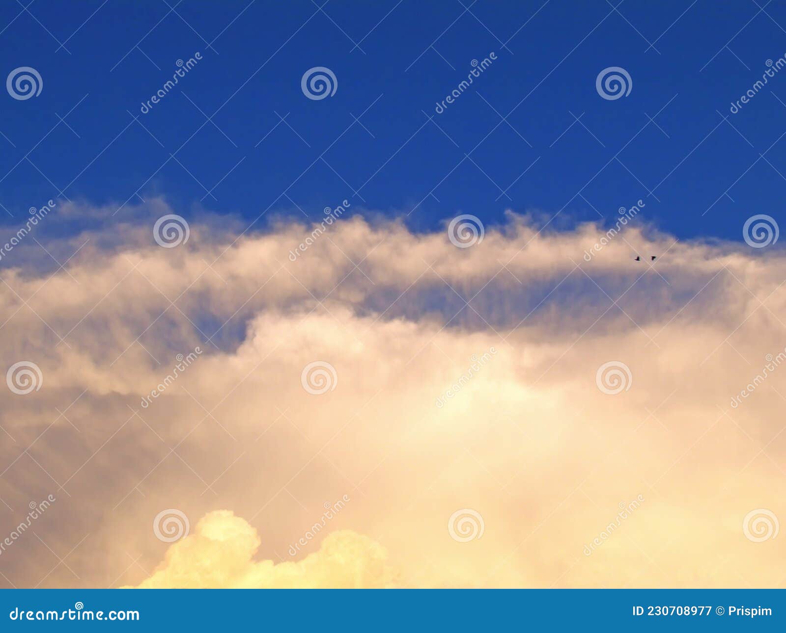 Fluffy White Clouds Clumped Together Against the Blue Sky Background ...