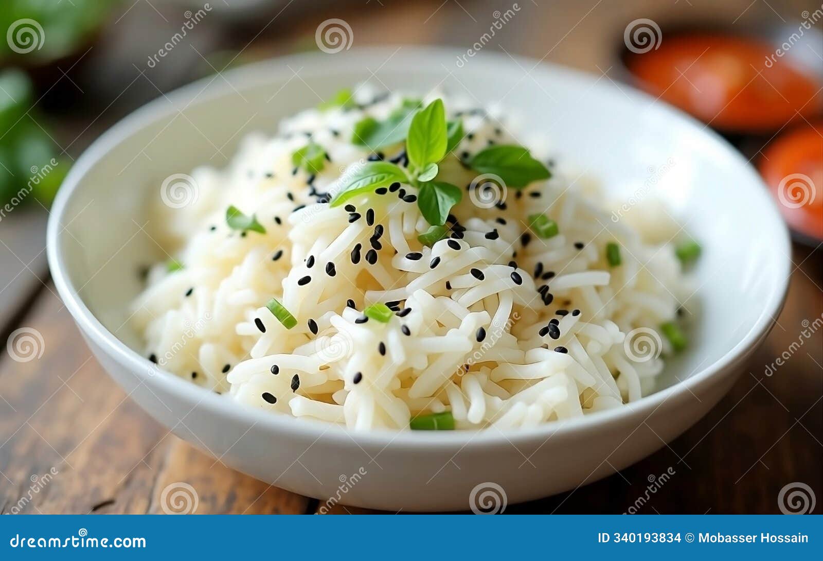 Fluffy White Rice with Mustard Seeds and Herbs on Wood Background Stock ...