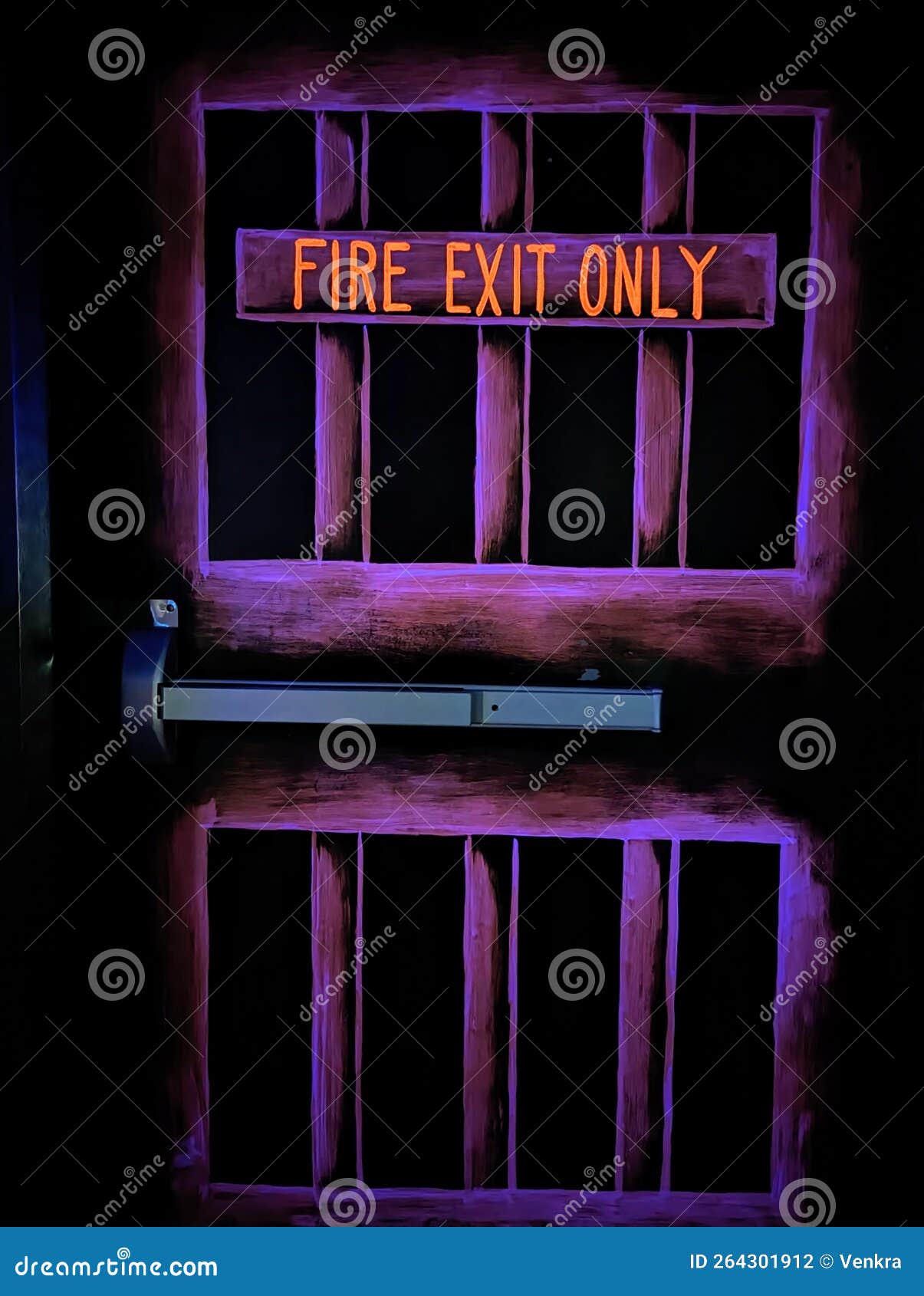 Fluorescent Glowing Fire Exit only Door Sign Stock Photo - Image of ...