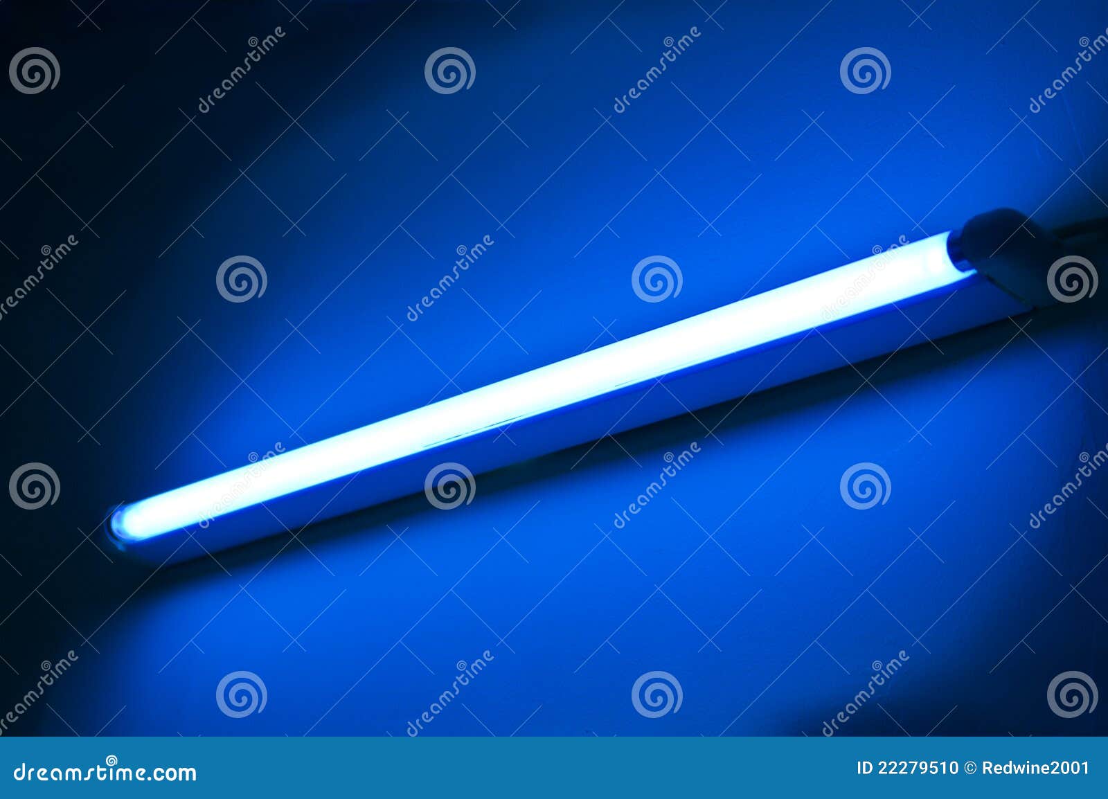 Fluorescent Lamp Shining on Blue Colored Wall Stock Photo - Image of ...