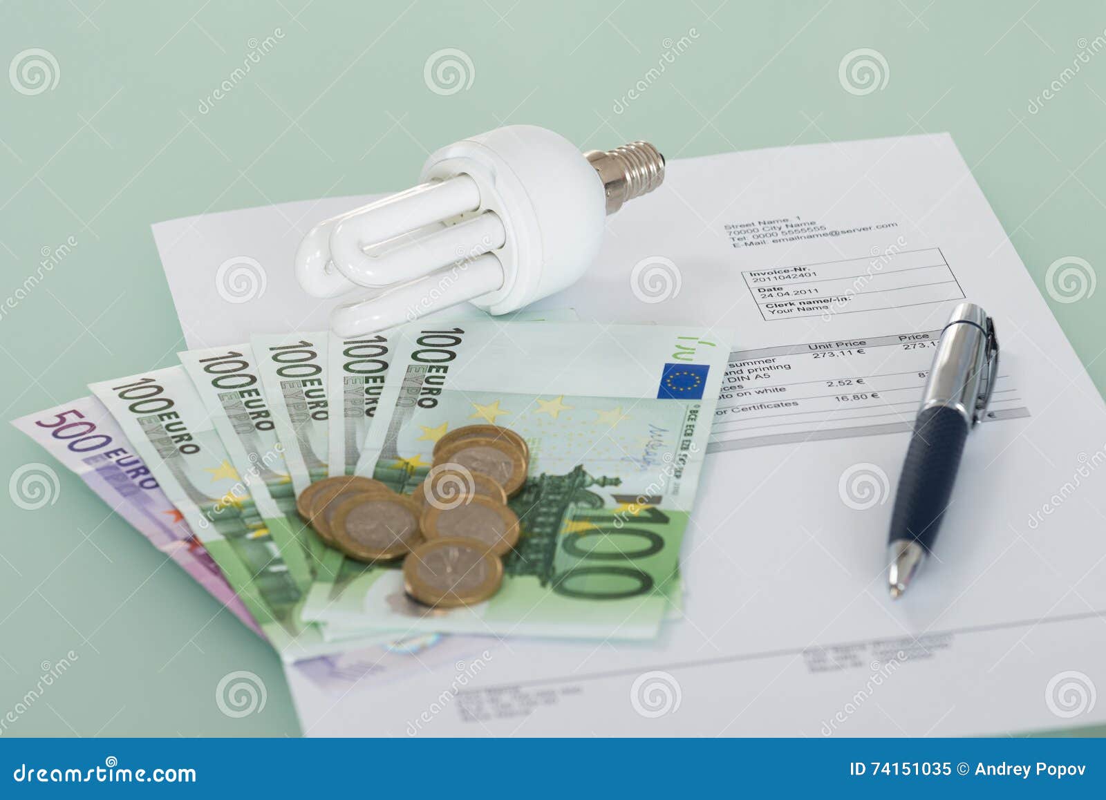 Fluorescent Light Bulb with Invoice and Currency Stock Image - Image of ...
