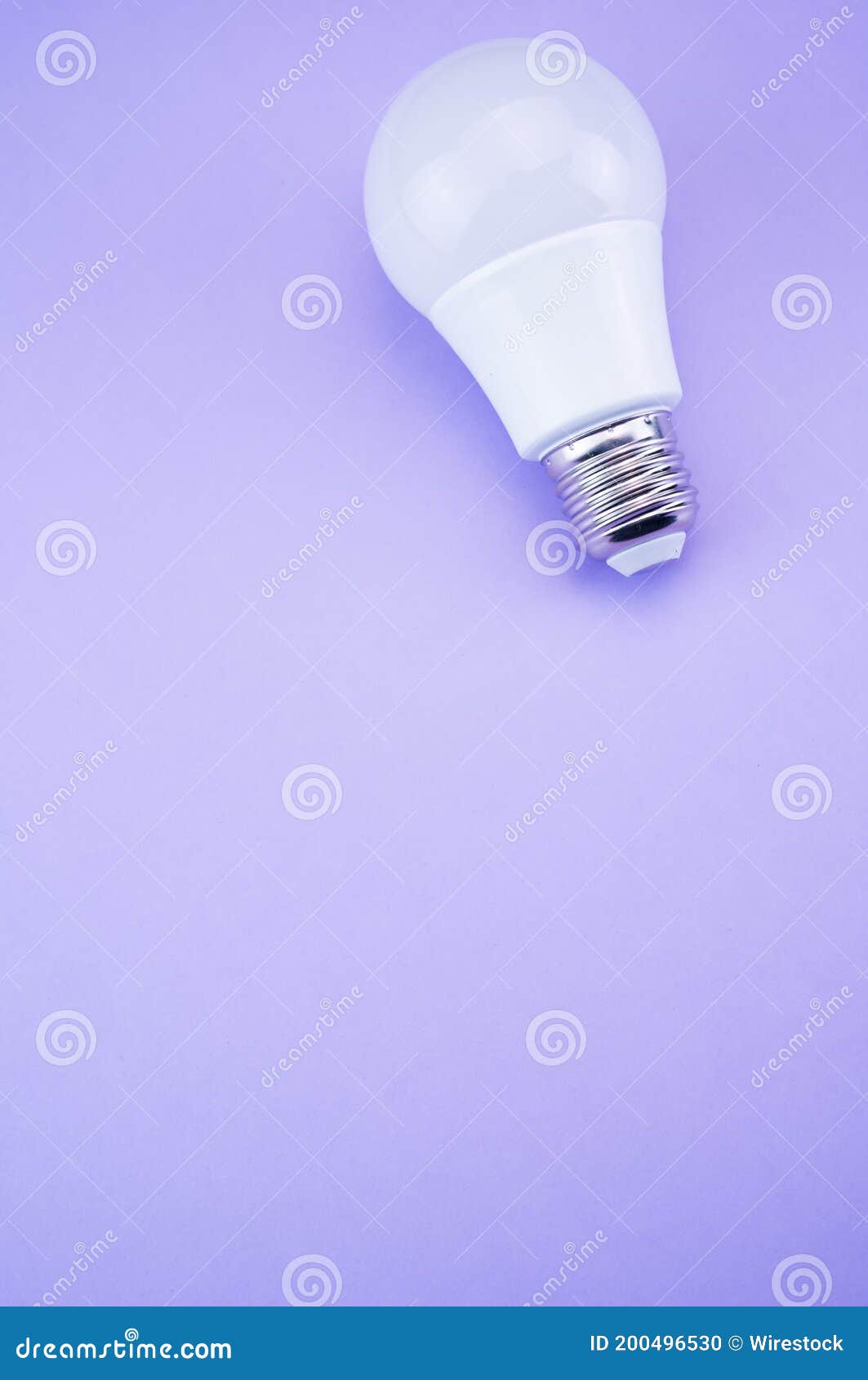 Fluorescent Light Bulb on the Purple Surface Stock Photo - Image of ...