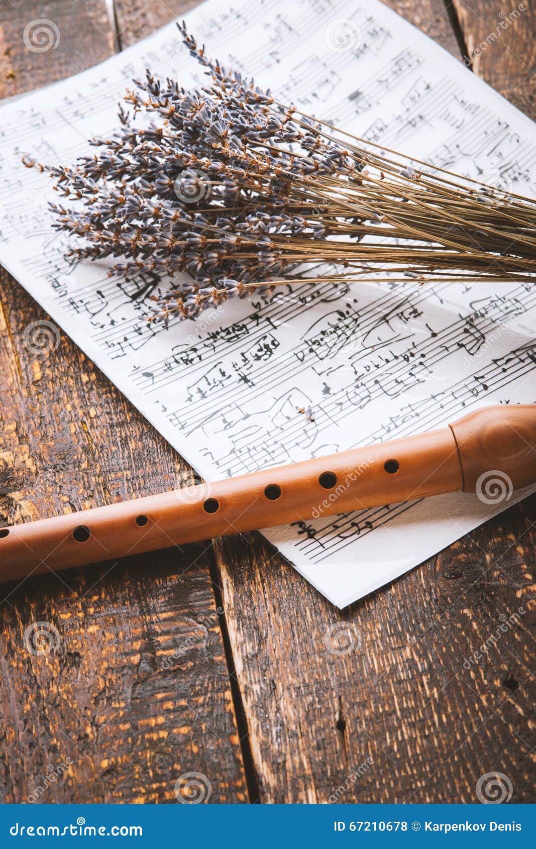 Flute with Notes and Lavender on the Wooden Table Vertical Stock Photo ...