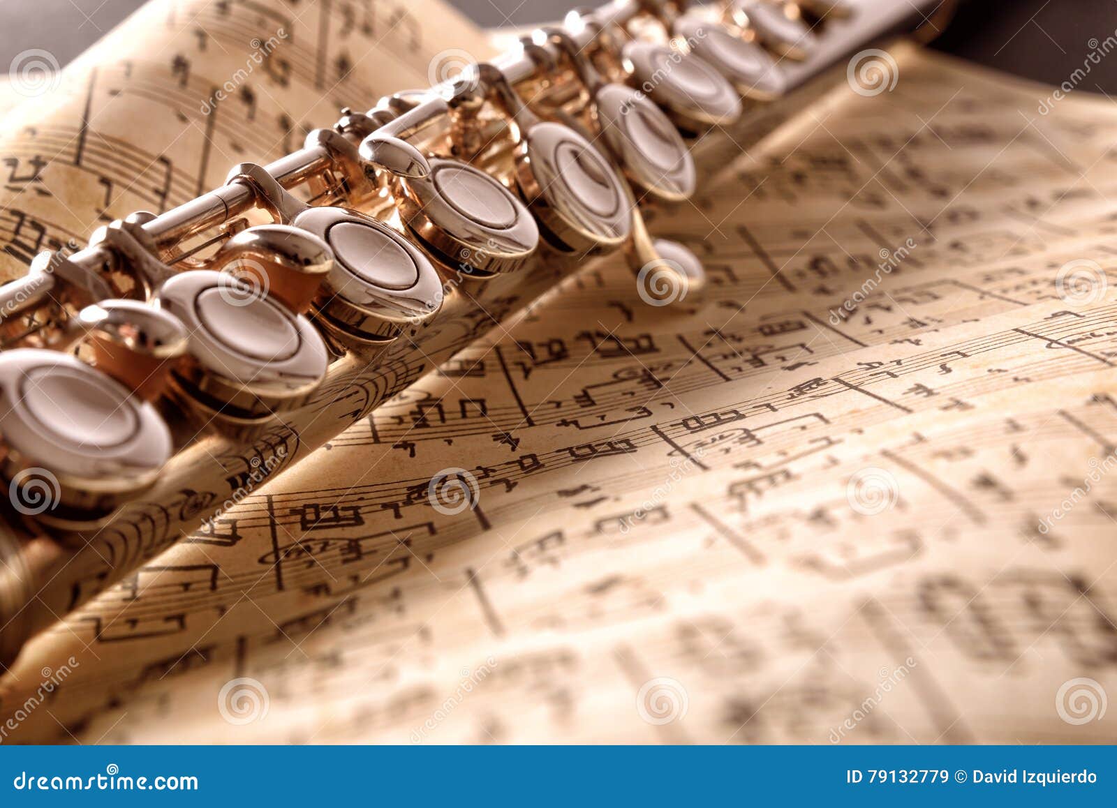 Flute and Old Sheet Music on Black Table Front Elevated View Stock ...