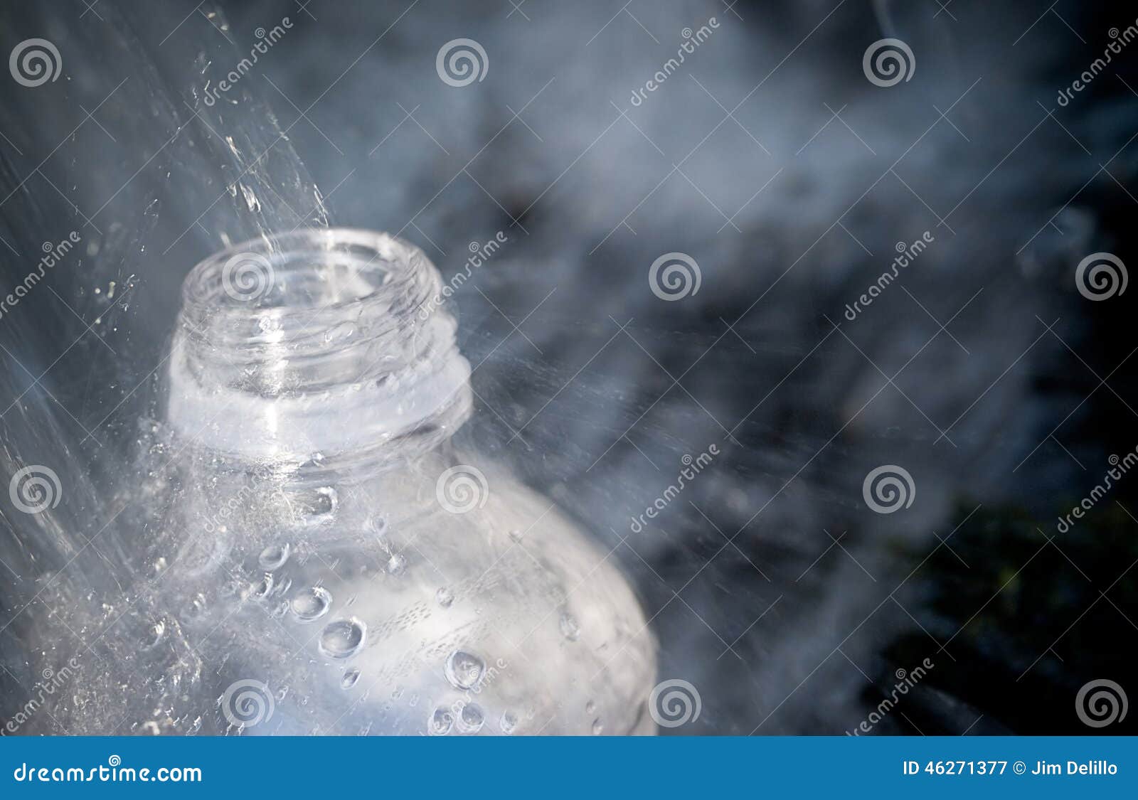 Flwoing Water with bottle stock image. Image of liquid - 46271377