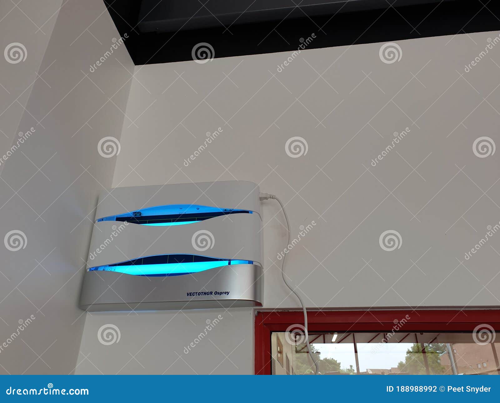 Fly Catcher Mounted on a Wall with Blue Light on Editorial Photography ...