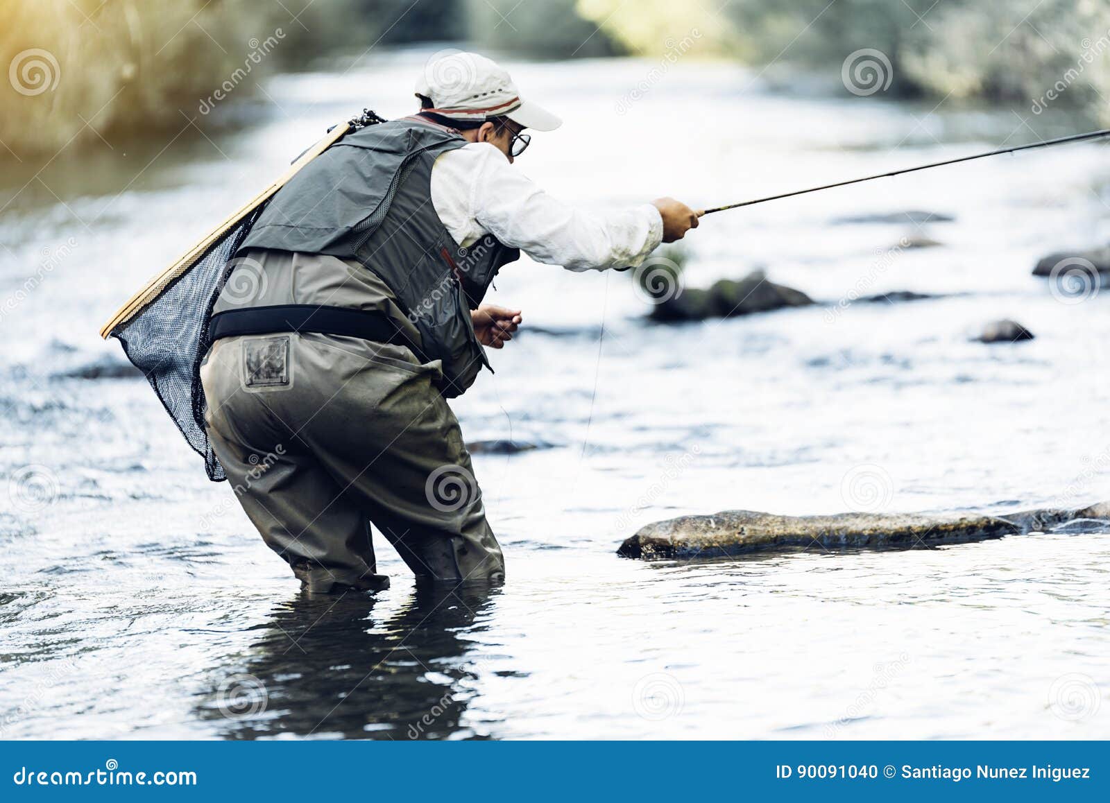 Fly Fisherman Using Flyfishing Rod. Stock Photo - Image of hobby ...