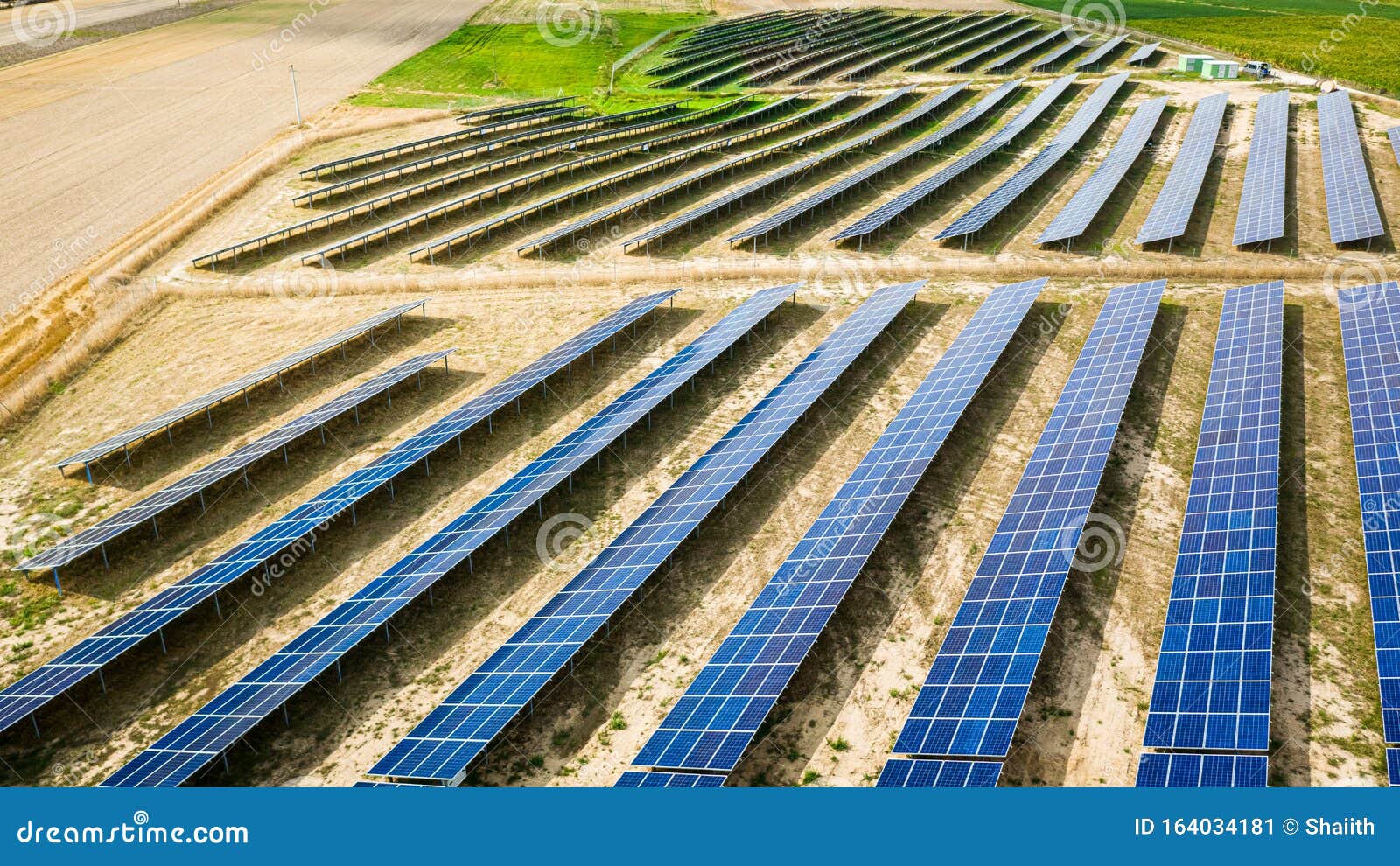 Flying Above Big and Blue Solar Panels on Dry Field Stock Image - Image ...