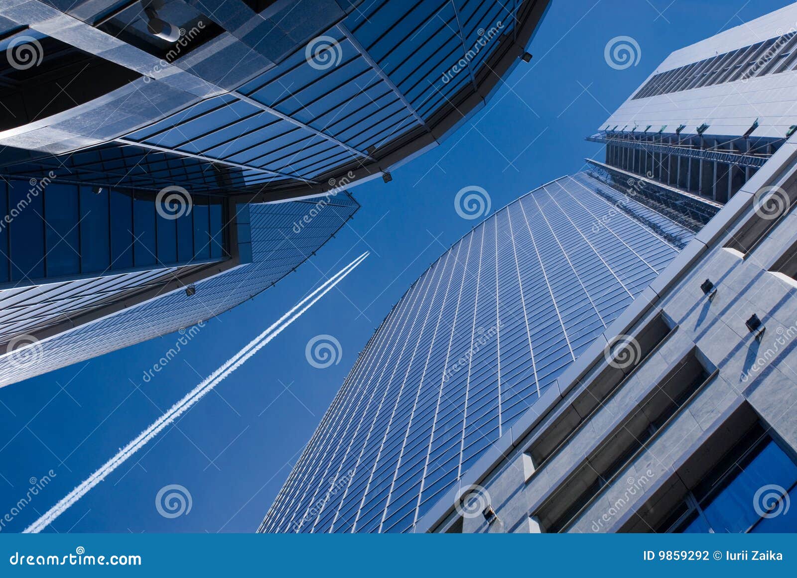 Flying Airplane and Office Buildings Stock Photo - Image of ...