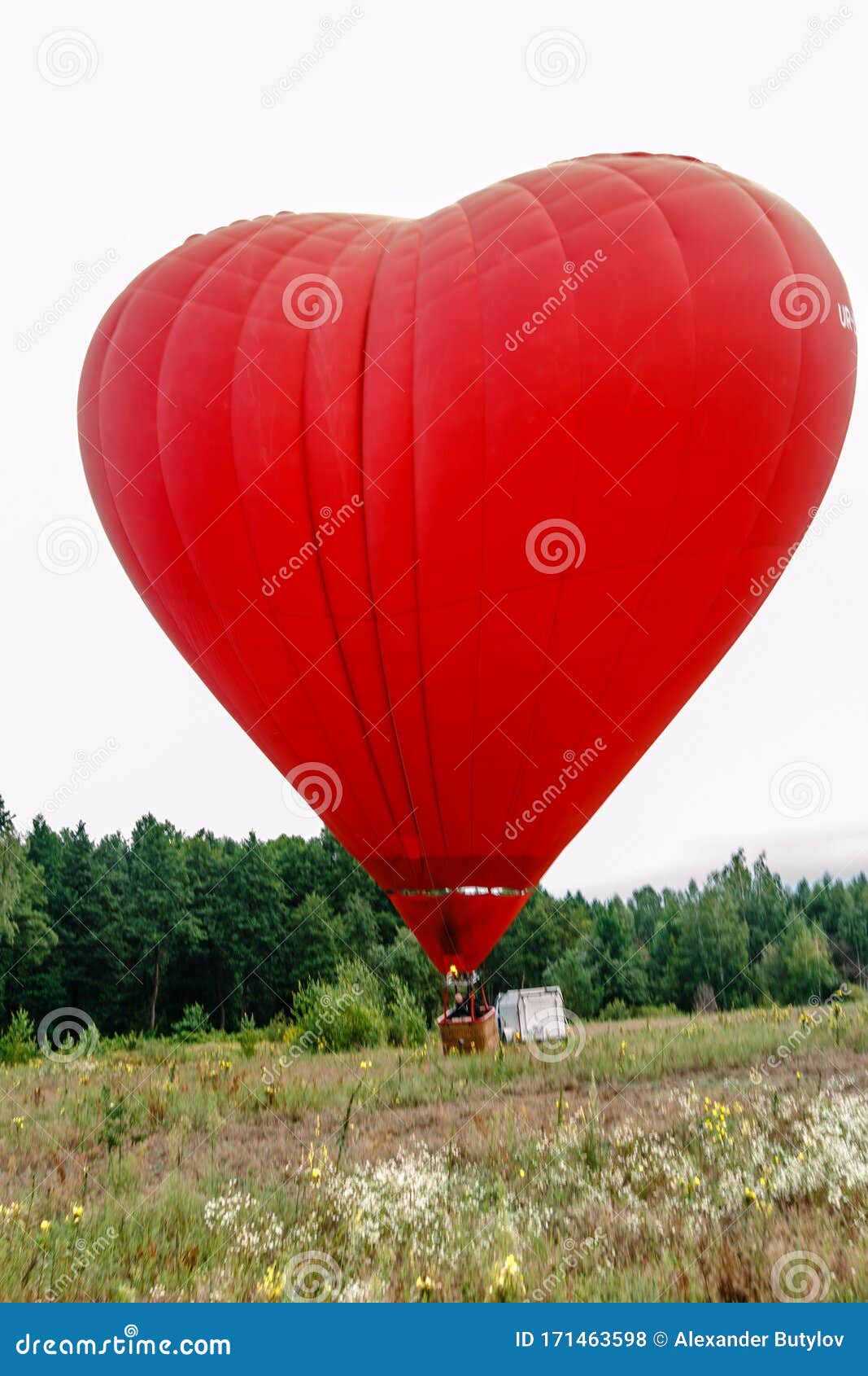 Flying a Balloon in the Shape of a Heart Stock Photo - Image of heart ...
