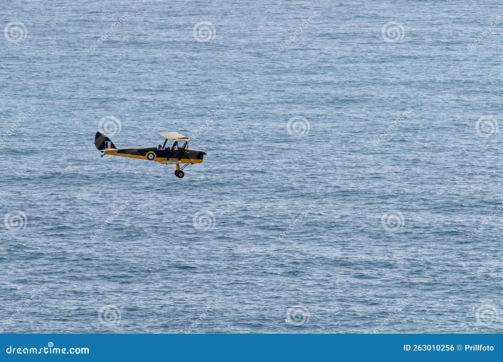 Flying biplane stock photo. Image of transportation - 263010256