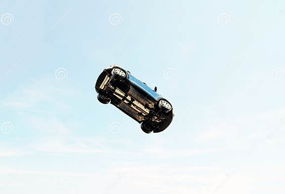 Flying Car on Its Side in Midair Stock Photo - Image of auto, drink ...