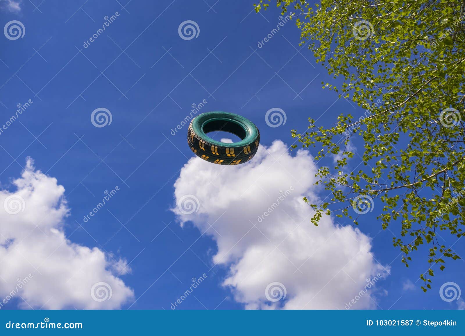 The flying car tire stock image. Image of blue, weeds - 103021587