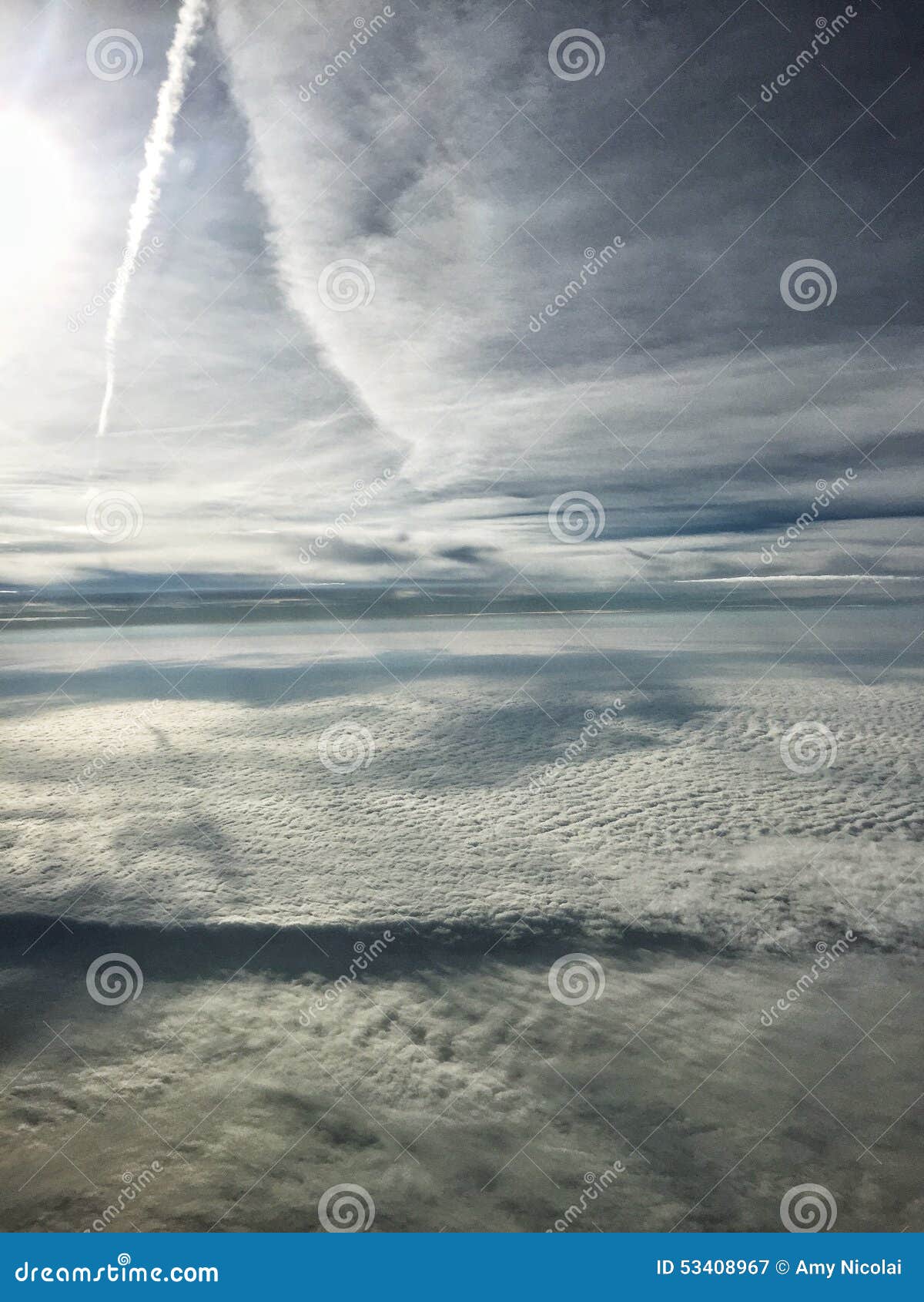 Flying between Cloud Layers Stock Image - Image of layers, contrail ...