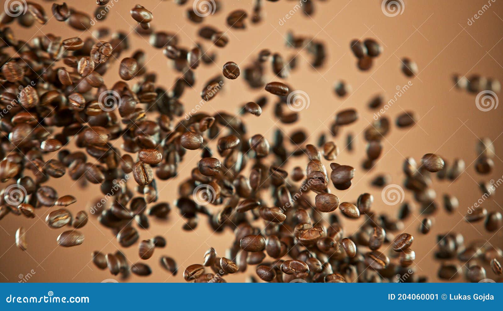 Flying Coffee Beans Isolated on Gradient Brown Background. Stock Image ...