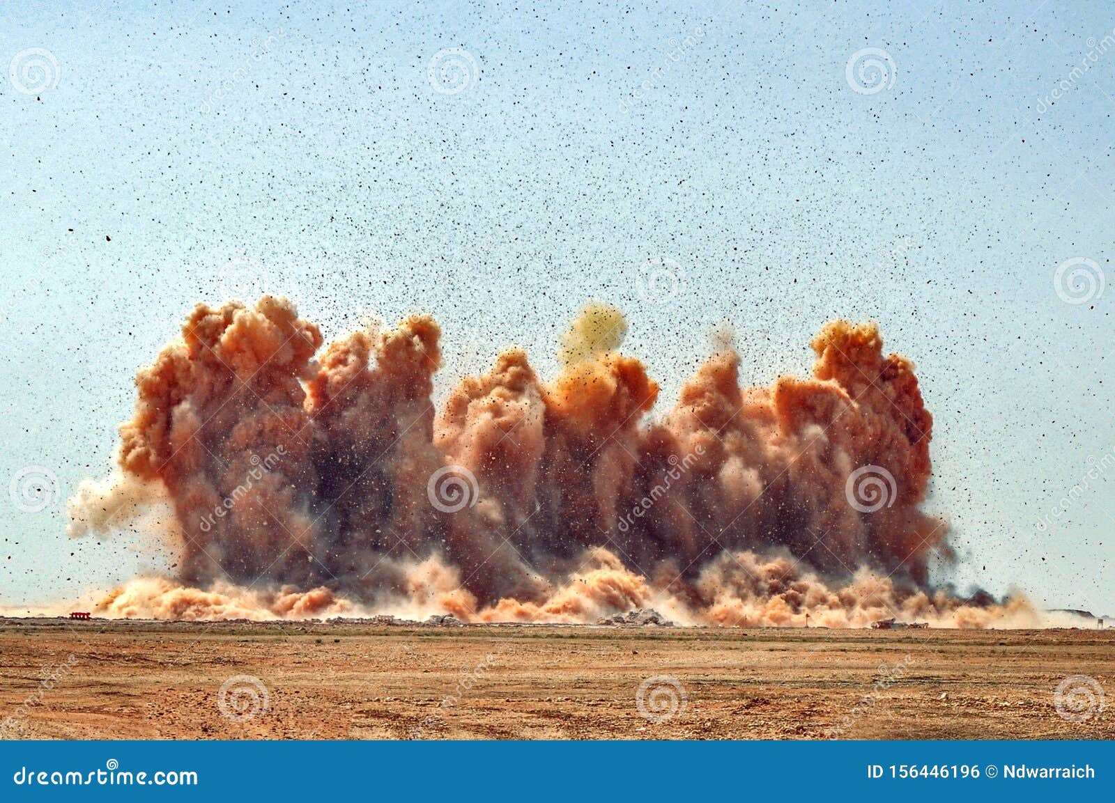 Flying Debris and Dust Clouds Stock Photo - Image of action ...