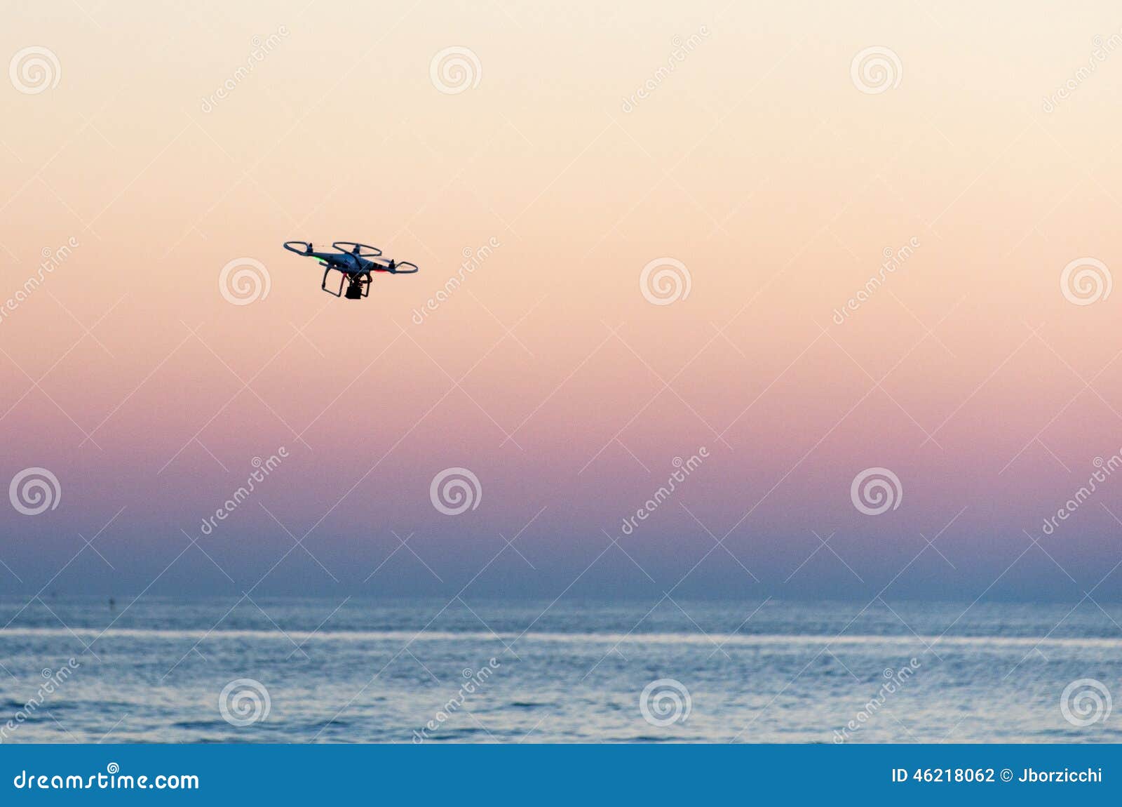 Flying Drone with Camera on the Sky at Sunset Stock Photo - Image of ...