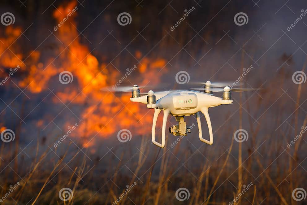 Flying drone in a fire stock photo. Image of fire, aviation - 89471030