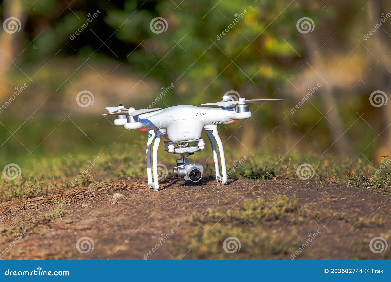 Flying drone on the grass stock photo. Image of control - 203602744